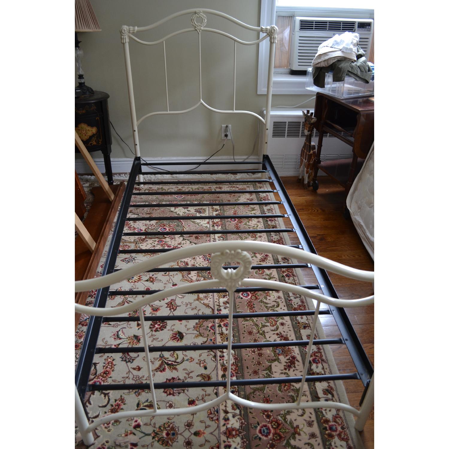 Two Twin Wrought Iron Beds - AptDeco