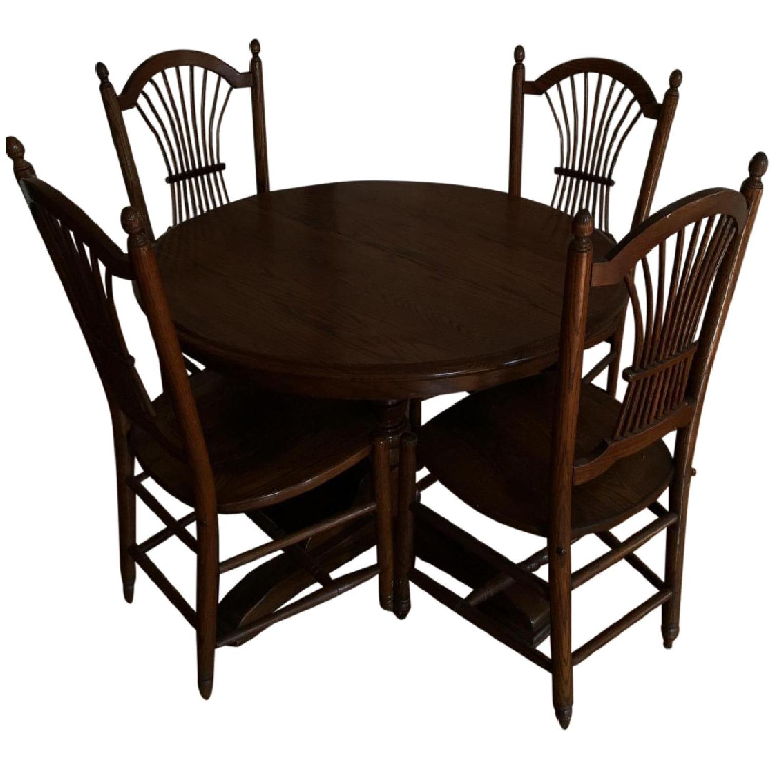 Solid Oak Dining Table w/ 4 Wheatback Chairs - AptDeco