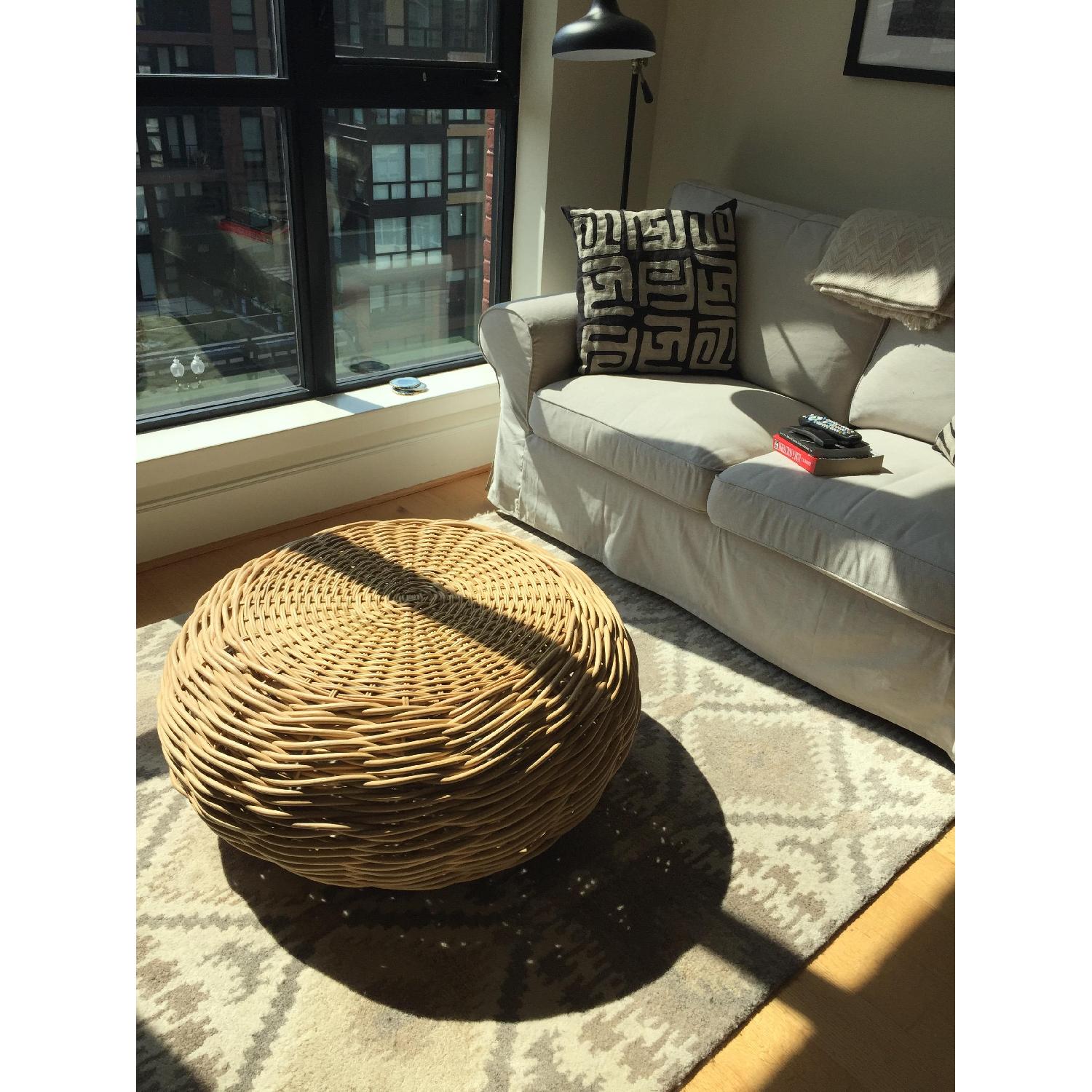 Crate & Barrel Rattan Coffee Table - AptDeco