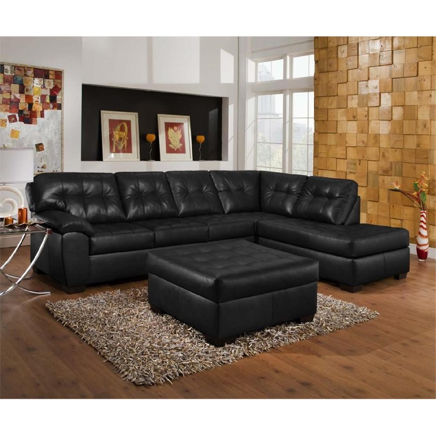 Rooms To Go Black Leather Sectional Couch - AptDeco