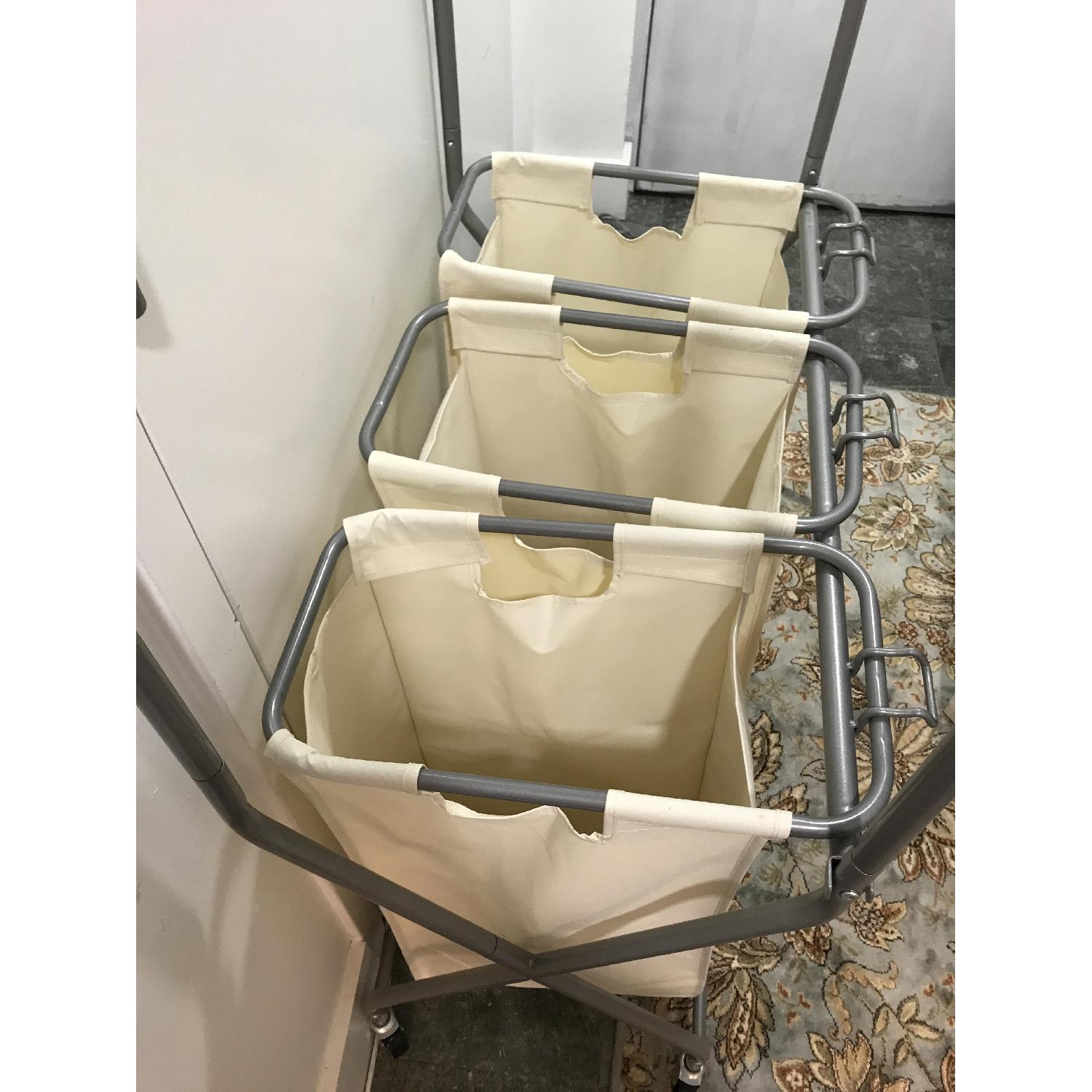 Gray Steel Clothes Rack w/ Hampers - AptDeco