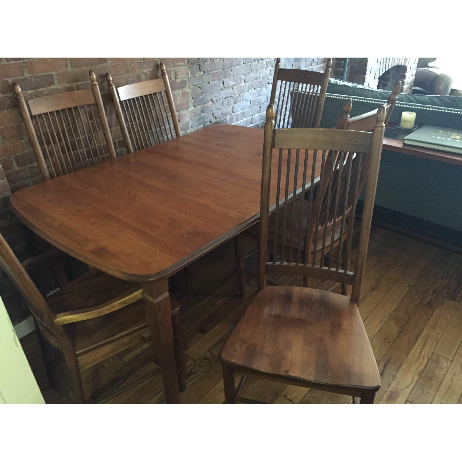 Extendable Cherry Dining Table w/ 6 Chairs - AptDeco
