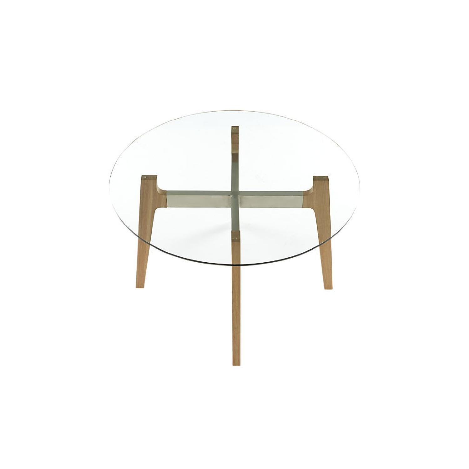 CB2 Round Dining Table w/ Glass Top - AptDeco