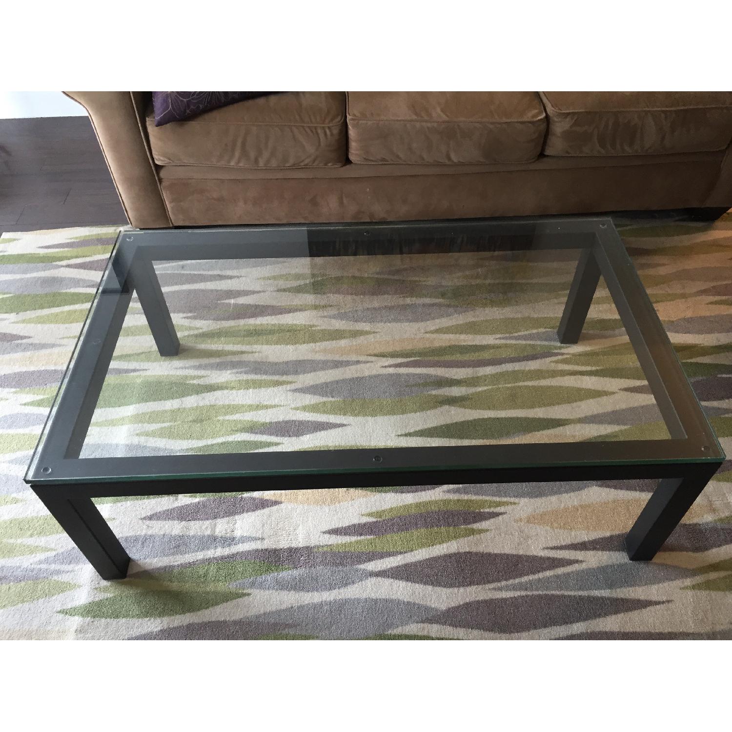 Crate & Barrel Parsons Rectangular Coffee Table with Glass Top - AptDeco