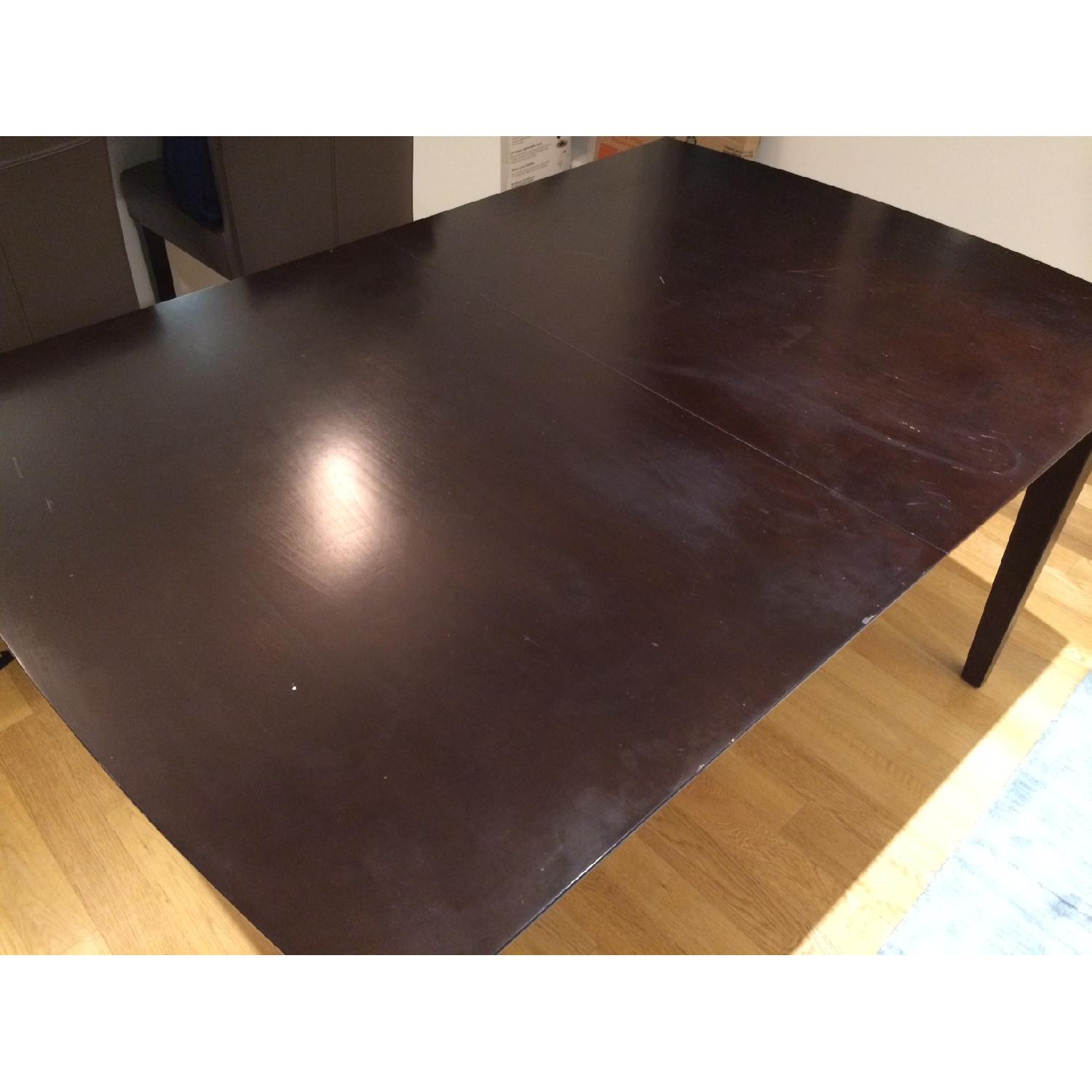 Extendable Dark Brown Dining Table - AptDeco