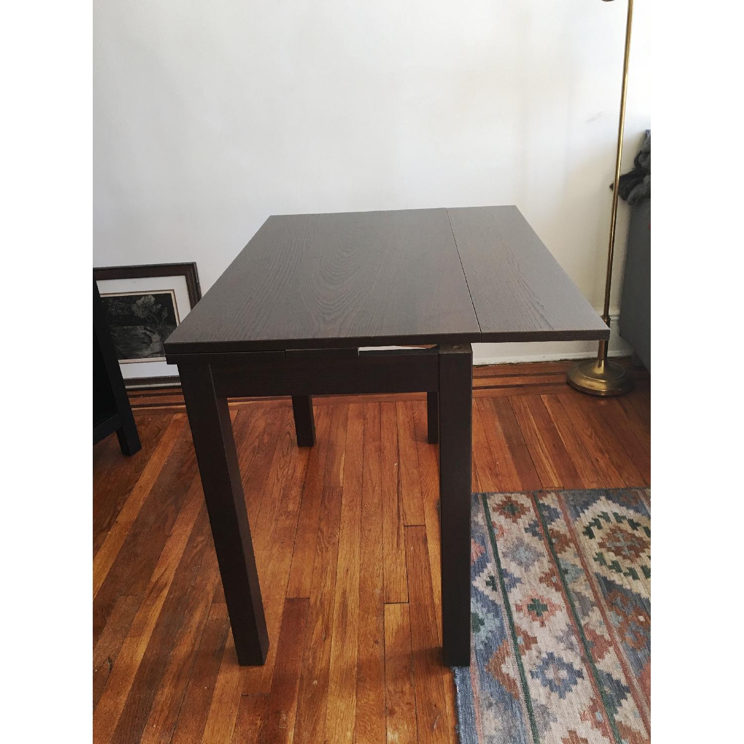 Ikea Bjursta Expandable Dining table - AptDeco