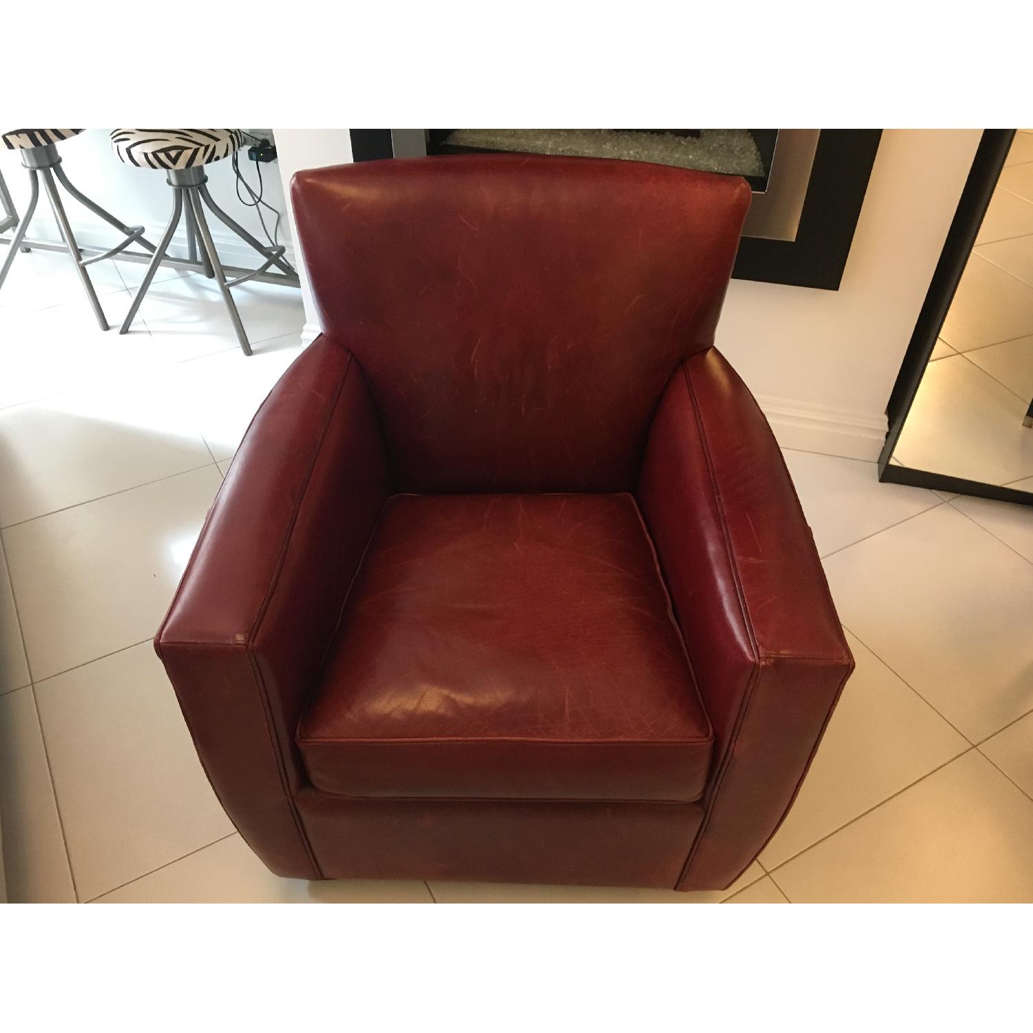 Crate & Barrel Crimson Leather Swivel Chair - AptDeco