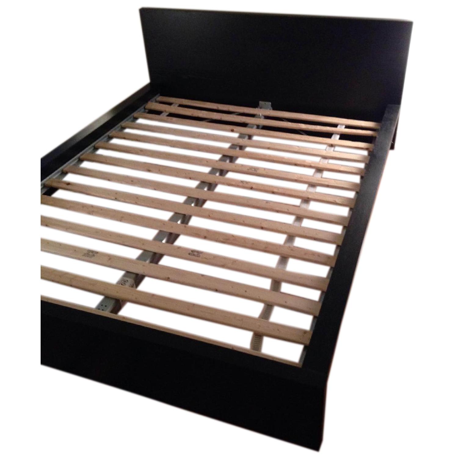 Ikea Malm Low Queen Bed Frame in Black - AptDeco
