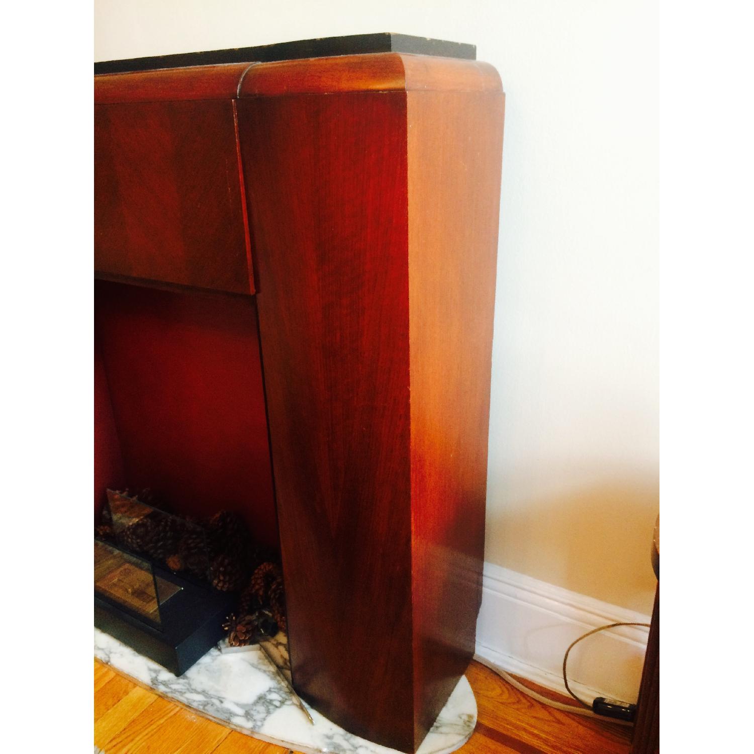 Prohibition Era Fireplace Mantel with Secret Bar Compartment - AptDeco