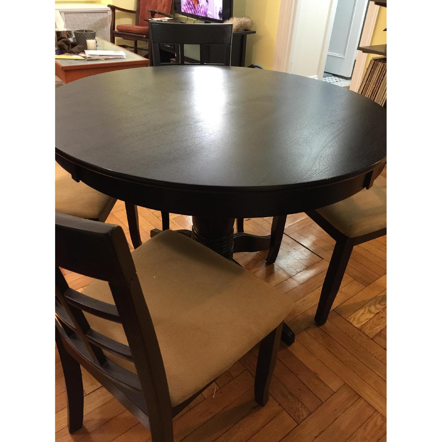Round Black Wooden Pedestal Dining Table w/ 4 Chairs - AptDeco