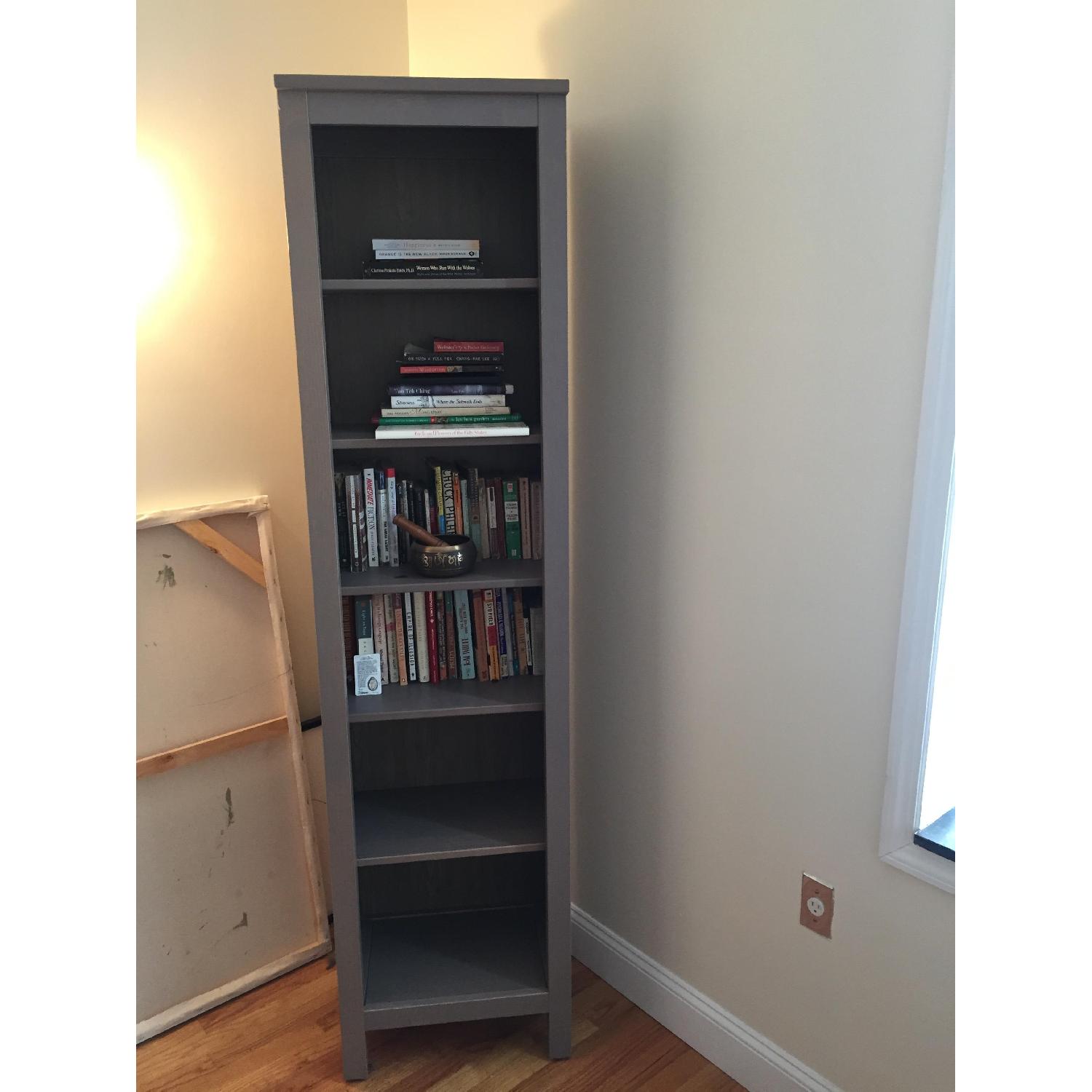 Ikea Solid Wood Bookcase with Four Shelves - AptDeco