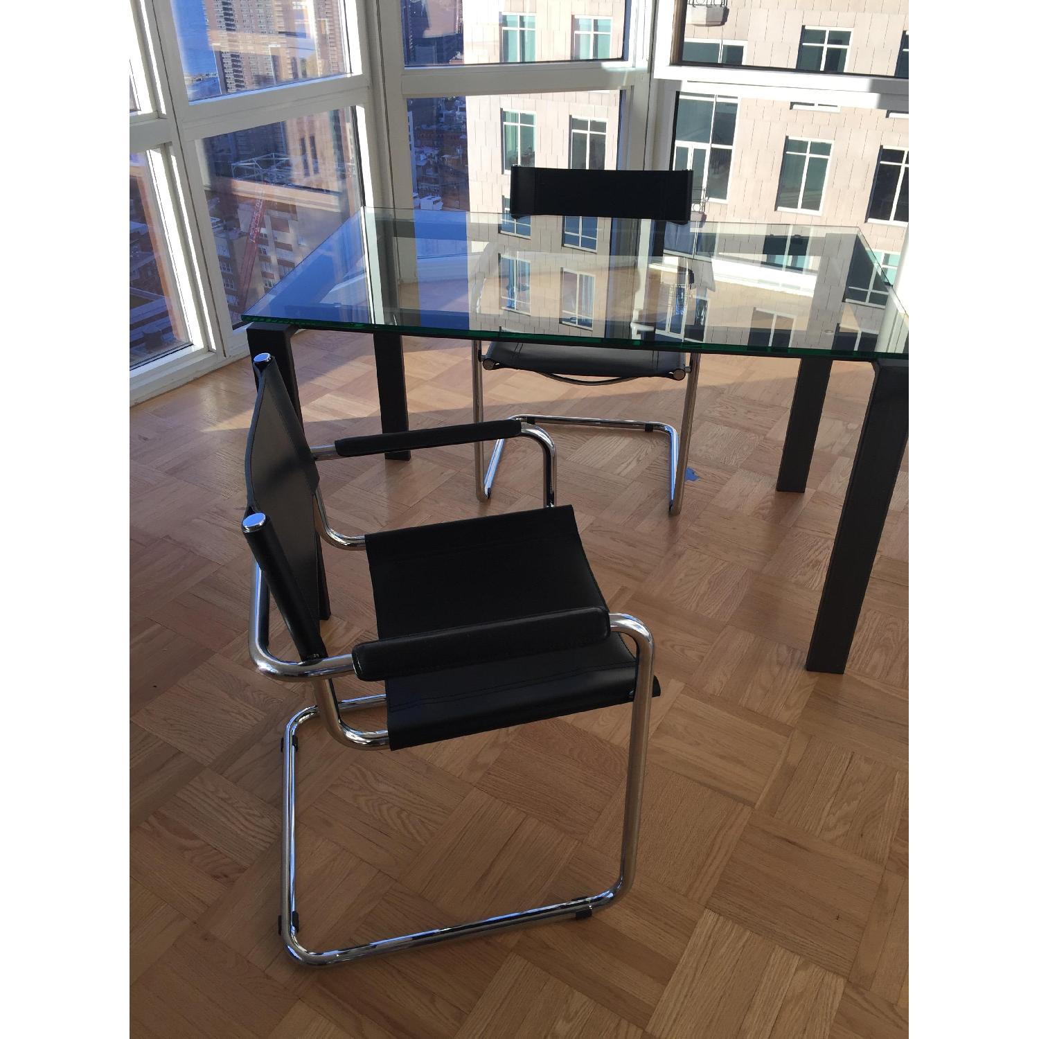 Room & Board Glass Top Dining Table w/ Black Metal Frame - AptDeco