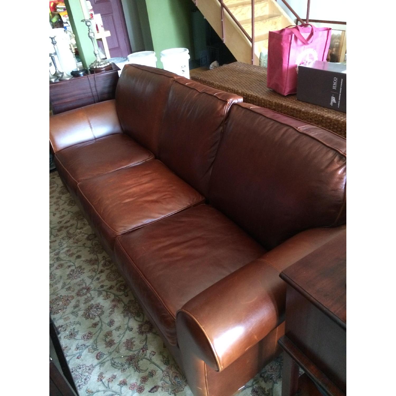 ABC Carpet and Home Leather Sofa w/ Queen Sleeper - AptDeco