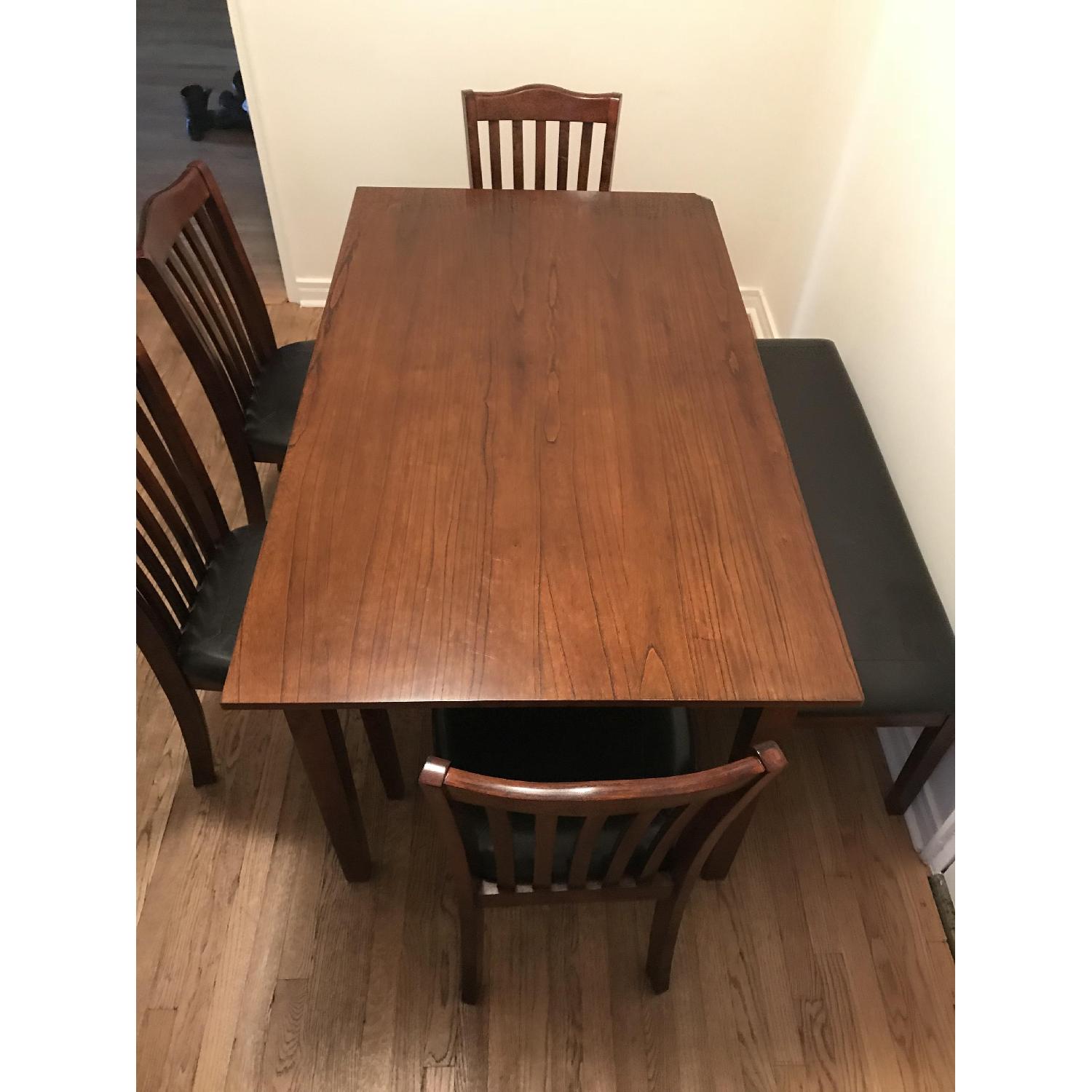 Evangeline Cherry Wood Dining Table - AptDeco