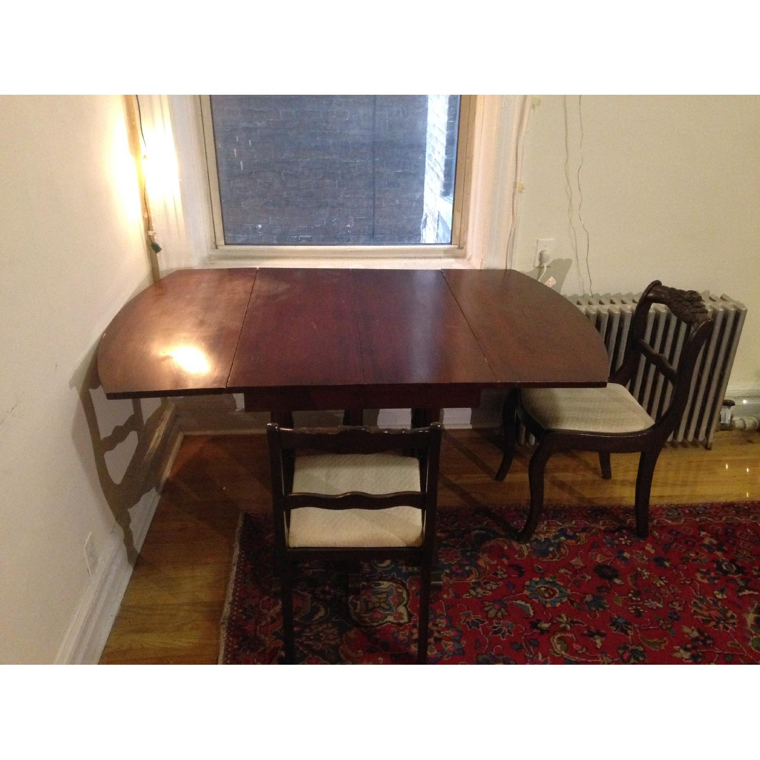 Vintage Extendable Dark Wood Dining Table - AptDeco