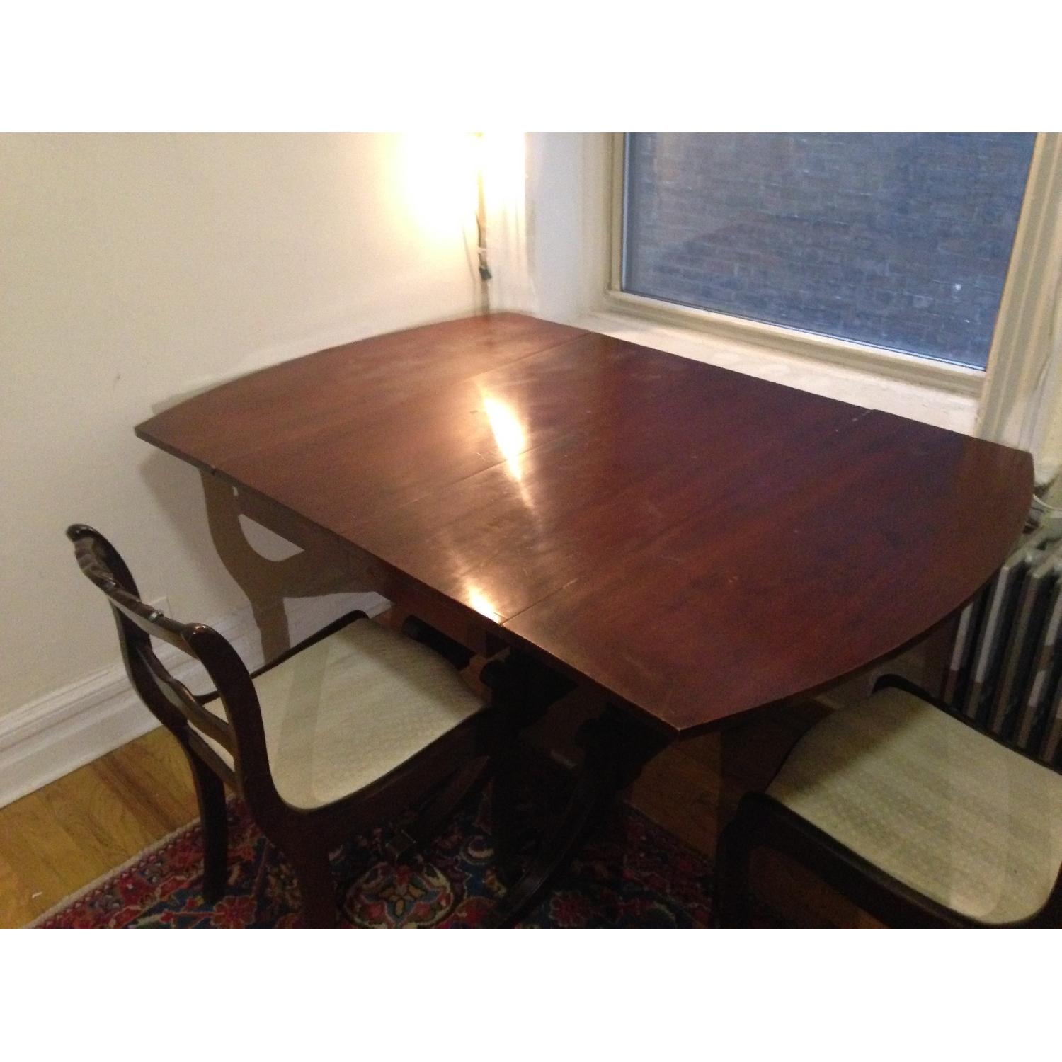 Vintage Extendable Dark Wood Dining Table - AptDeco