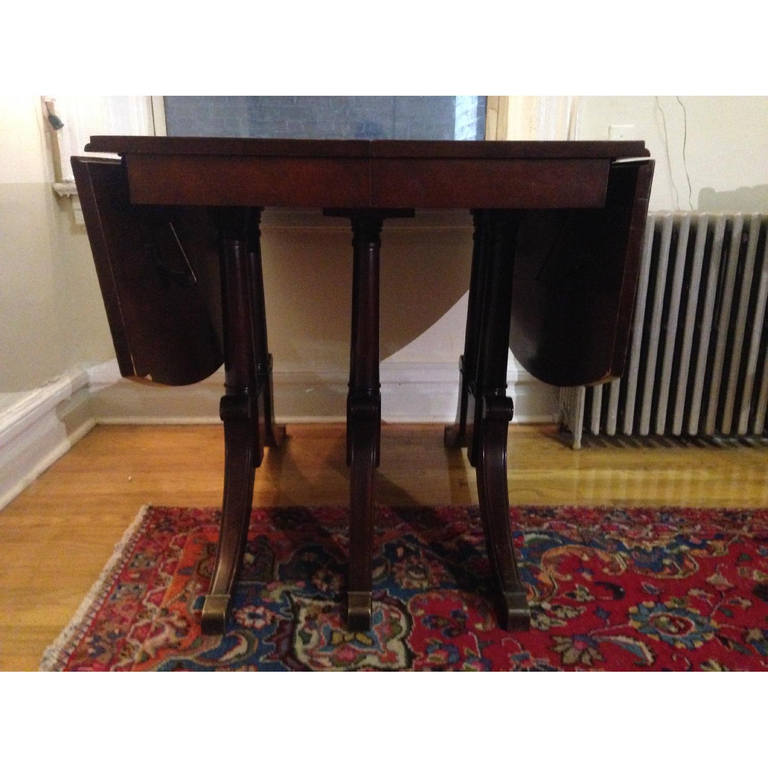 Vintage Extendable Dark Wood Dining Table - AptDeco