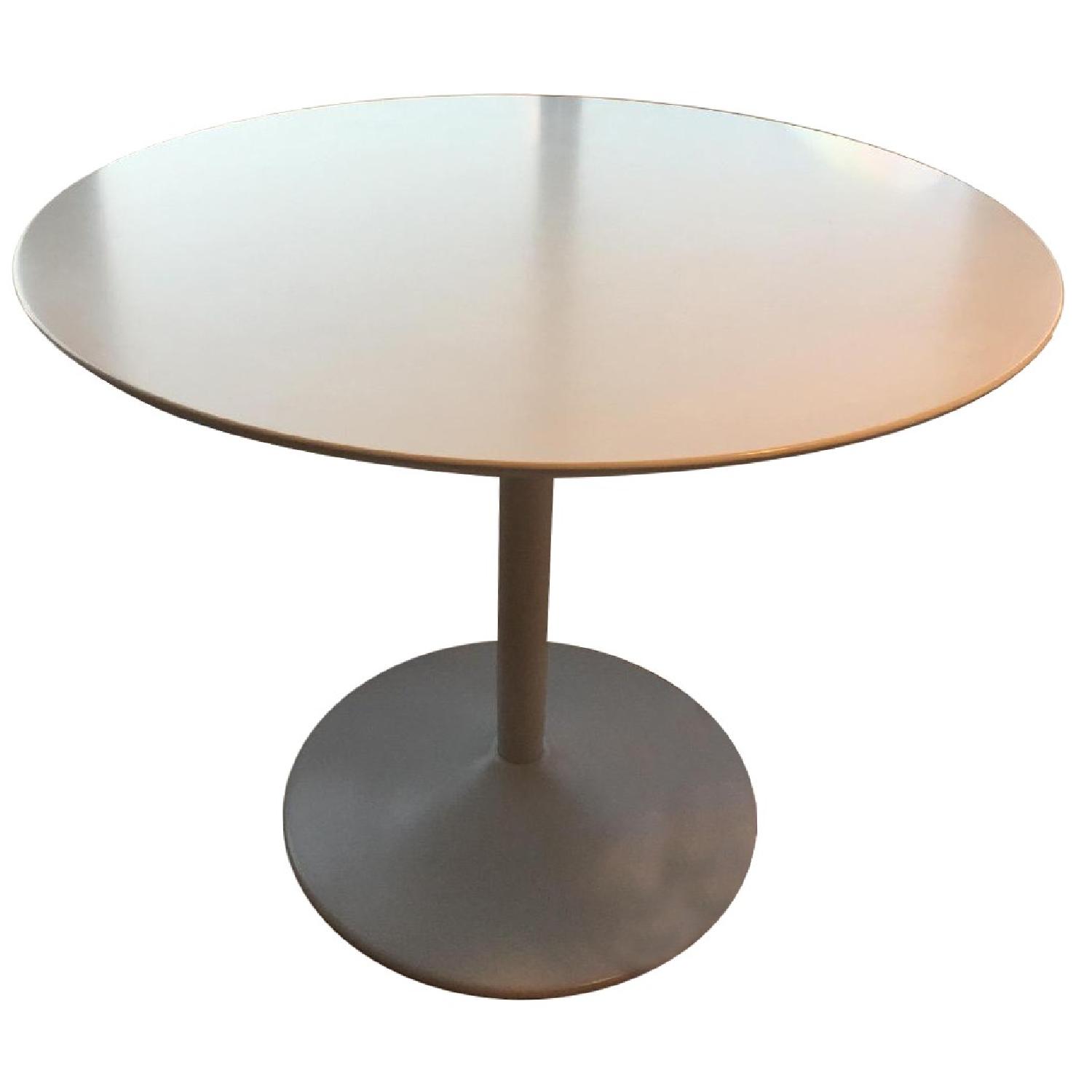 CB2 White Round Dining Table - AptDeco