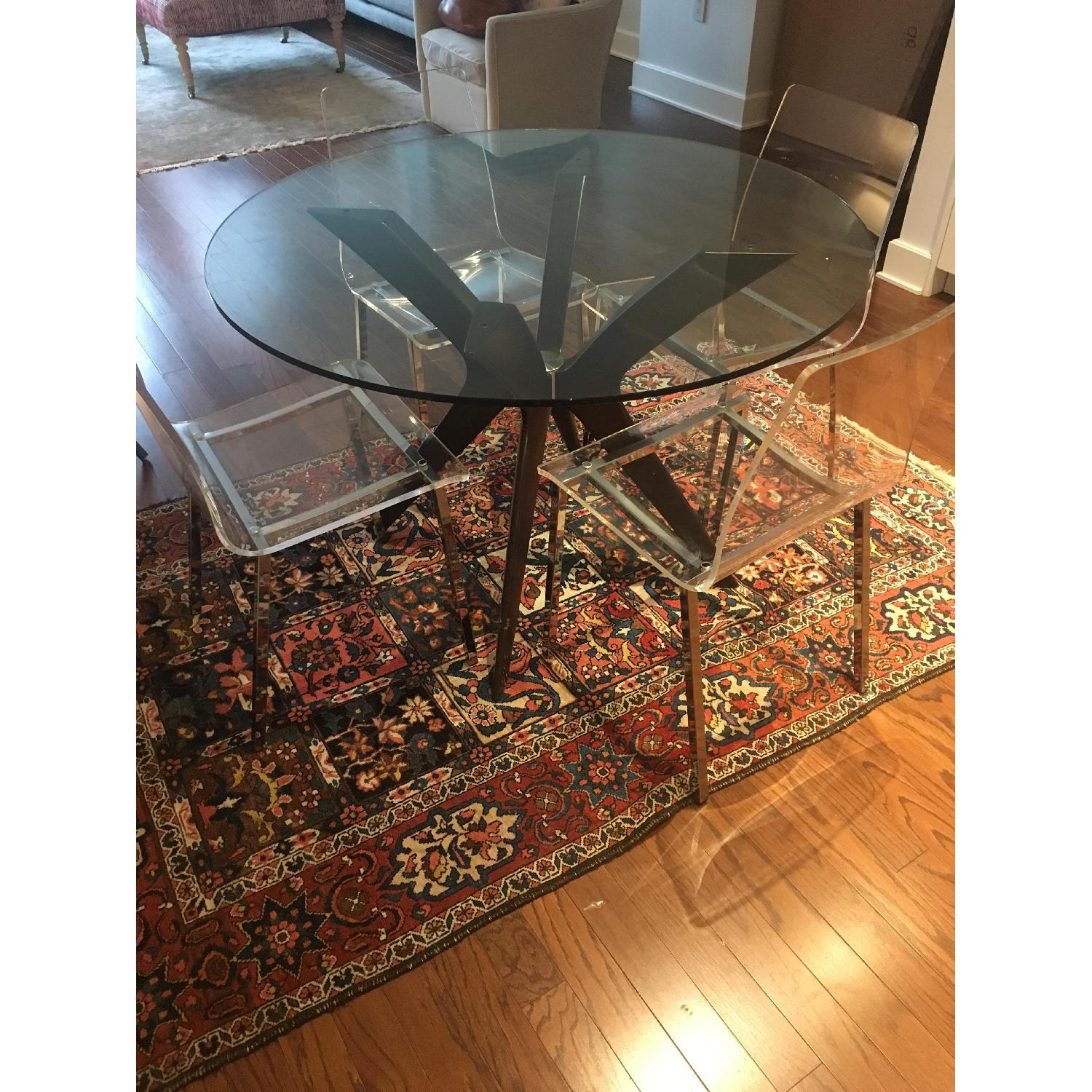 Jensen-Lewis Glass Top Round Dining Table - AptDeco