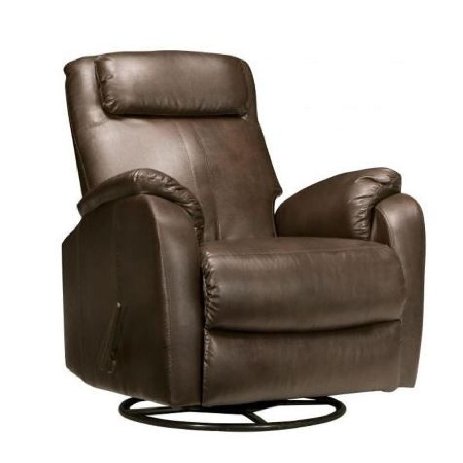 Raymour & Flanigan Baxter Swivel Rocker Recliner - AptDeco
