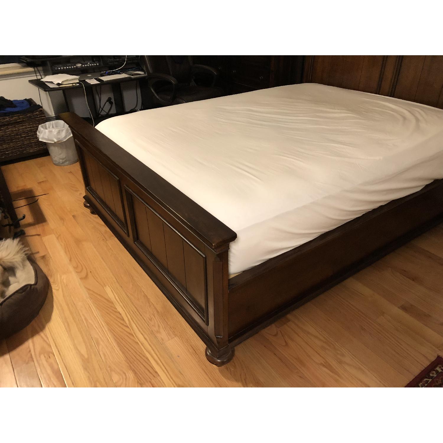 Raymour & Flanigan Solid Wood Queen Storage Platform Bed - AptDeco