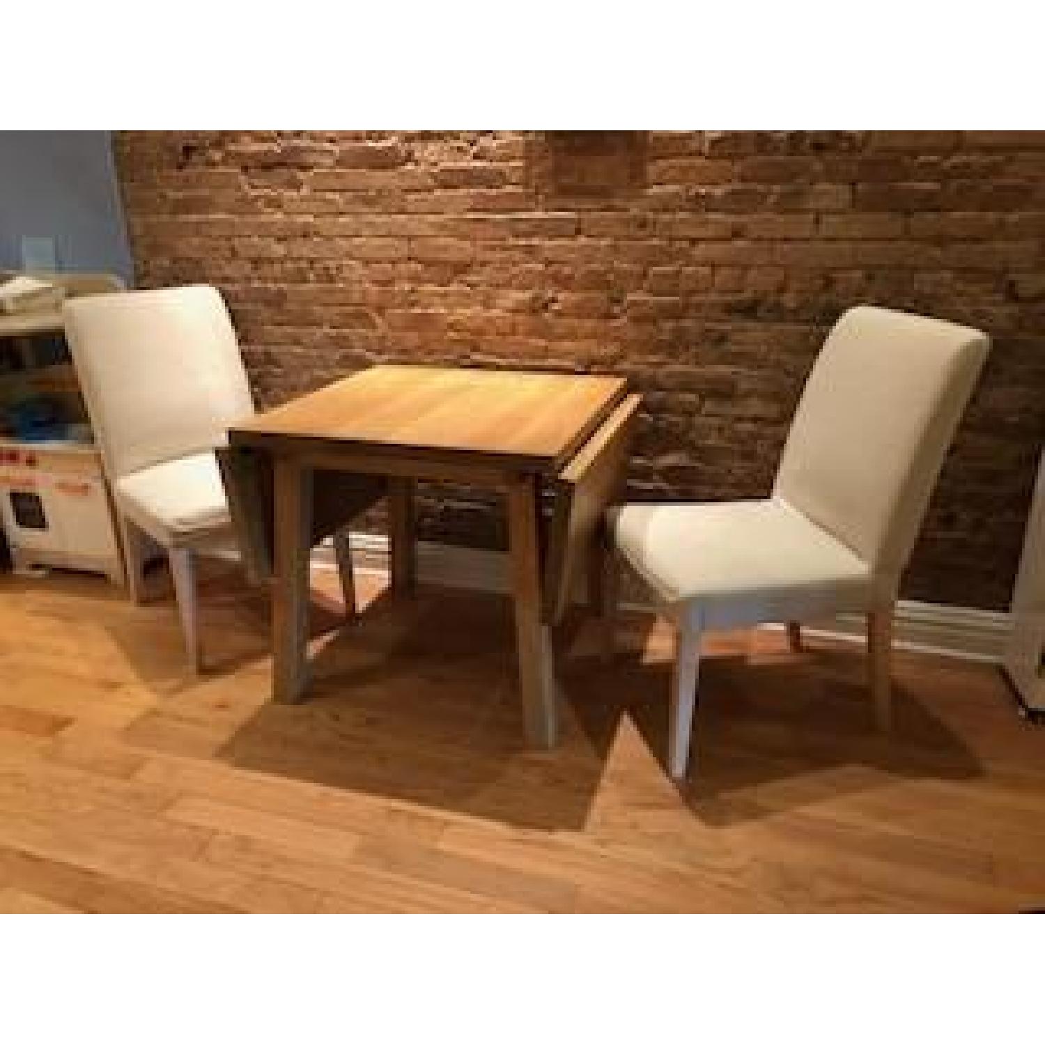 Ikea Extendable Wooden Dining Table w/ 2 Chairs - AptDeco