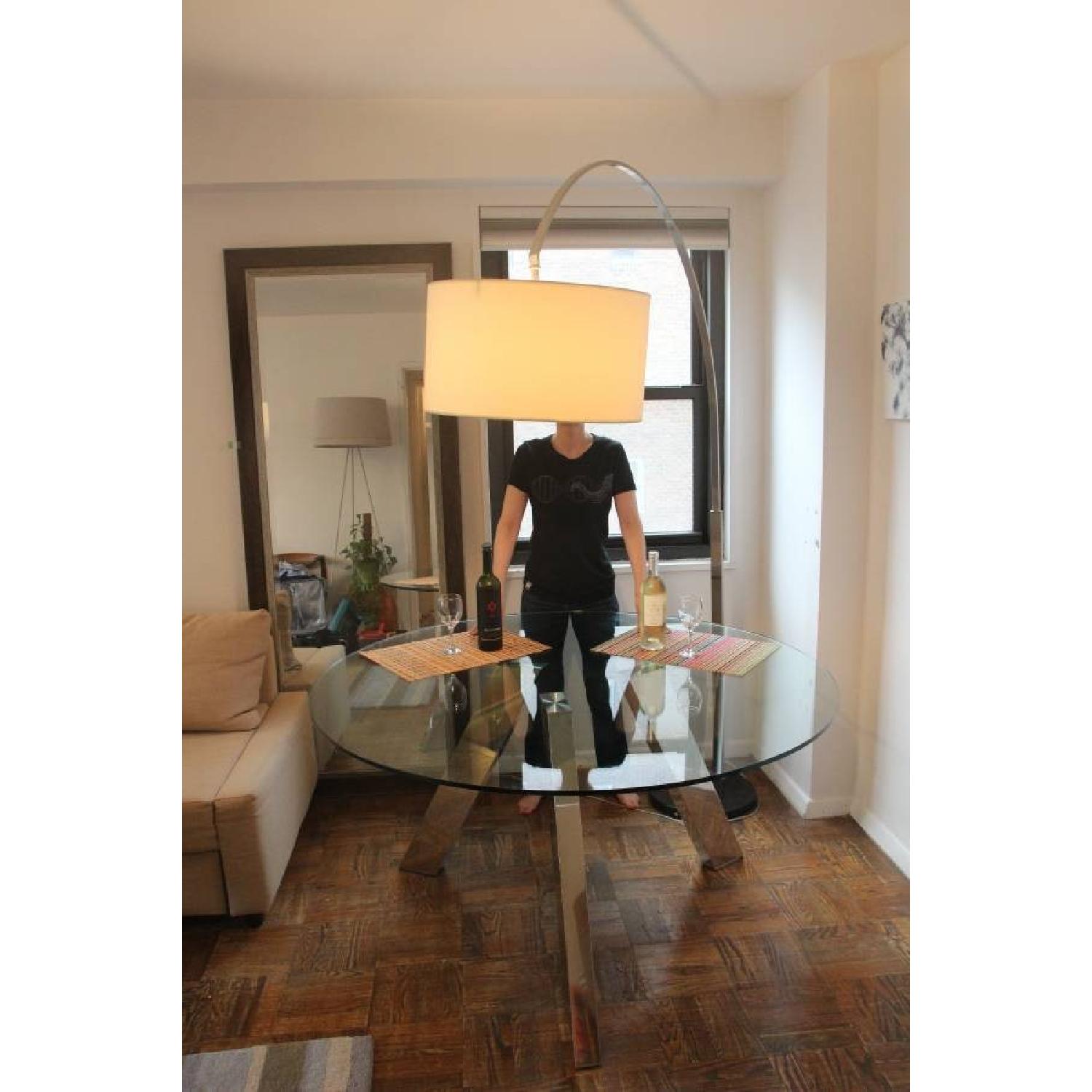 Jensen-Lewis Round Glass Dining Table - AptDeco