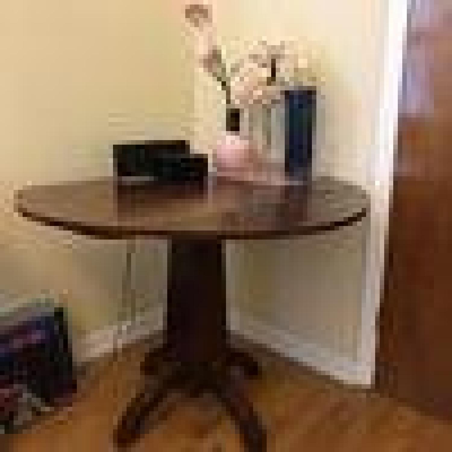 Anthropologie Wood Drop-Leaf Round Dining Table - AptDeco