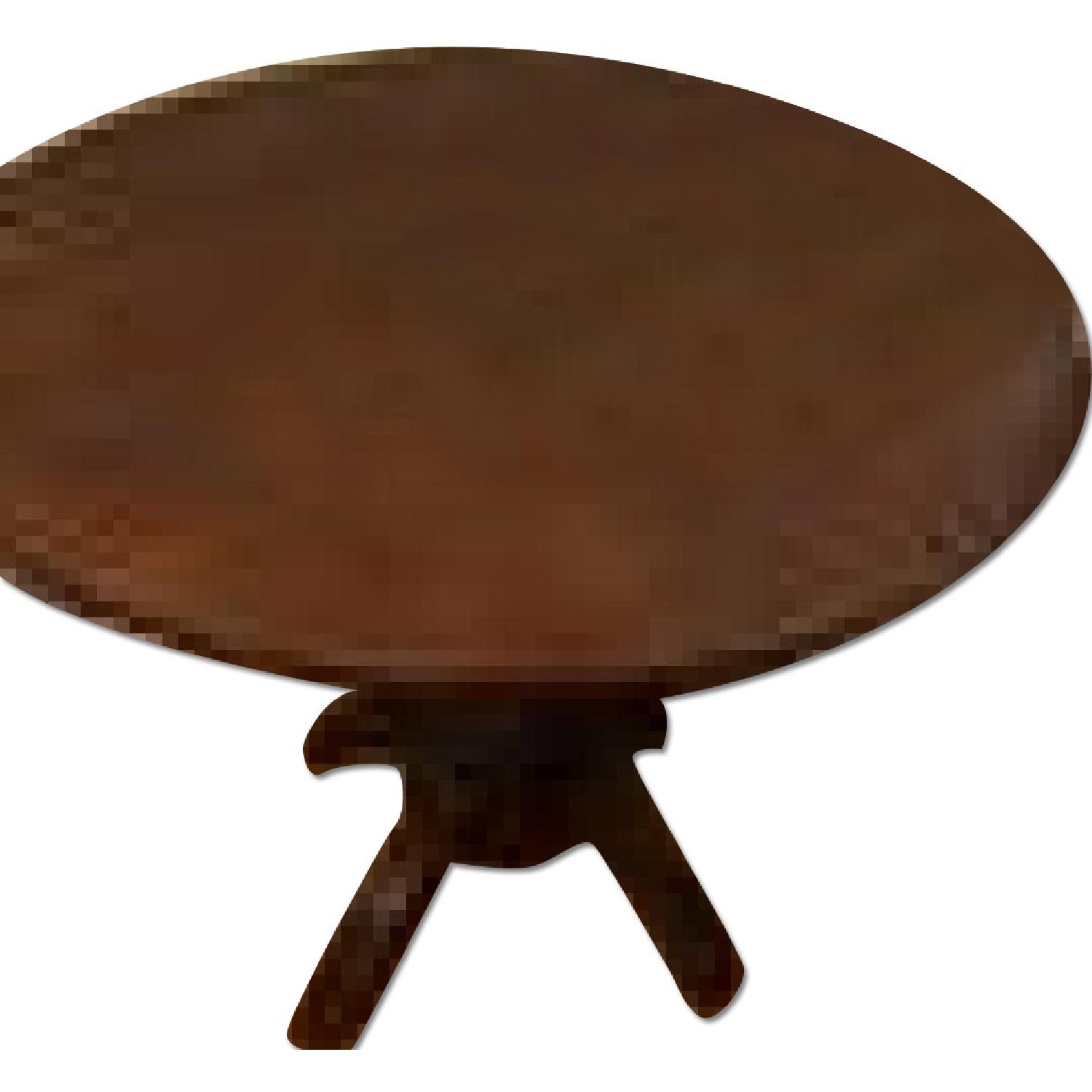 Anthropologie Wood Drop-Leaf Round Dining Table - AptDeco