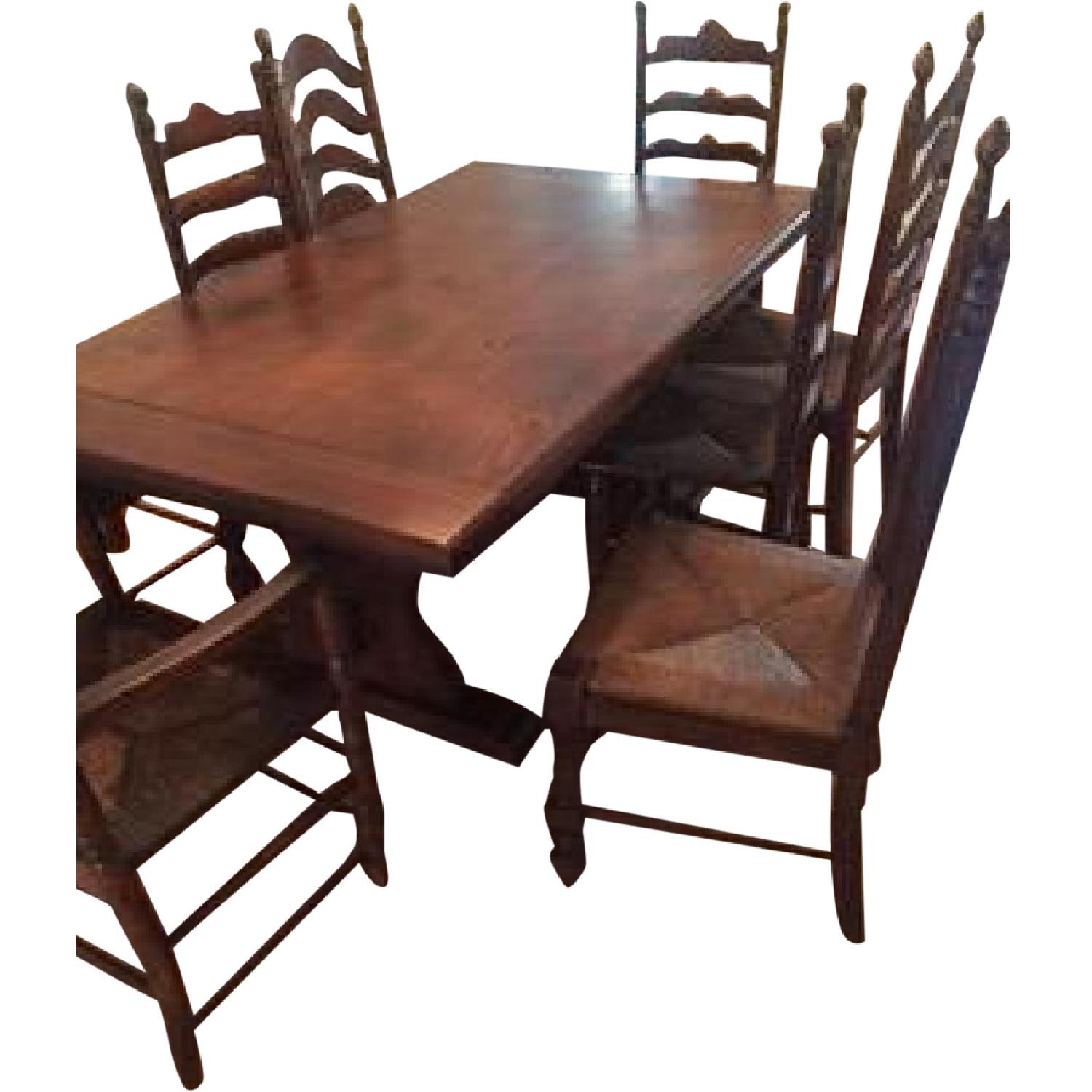 Antique Wood Trestle Expandable Dining Table w/ 8 Chairs - AptDeco