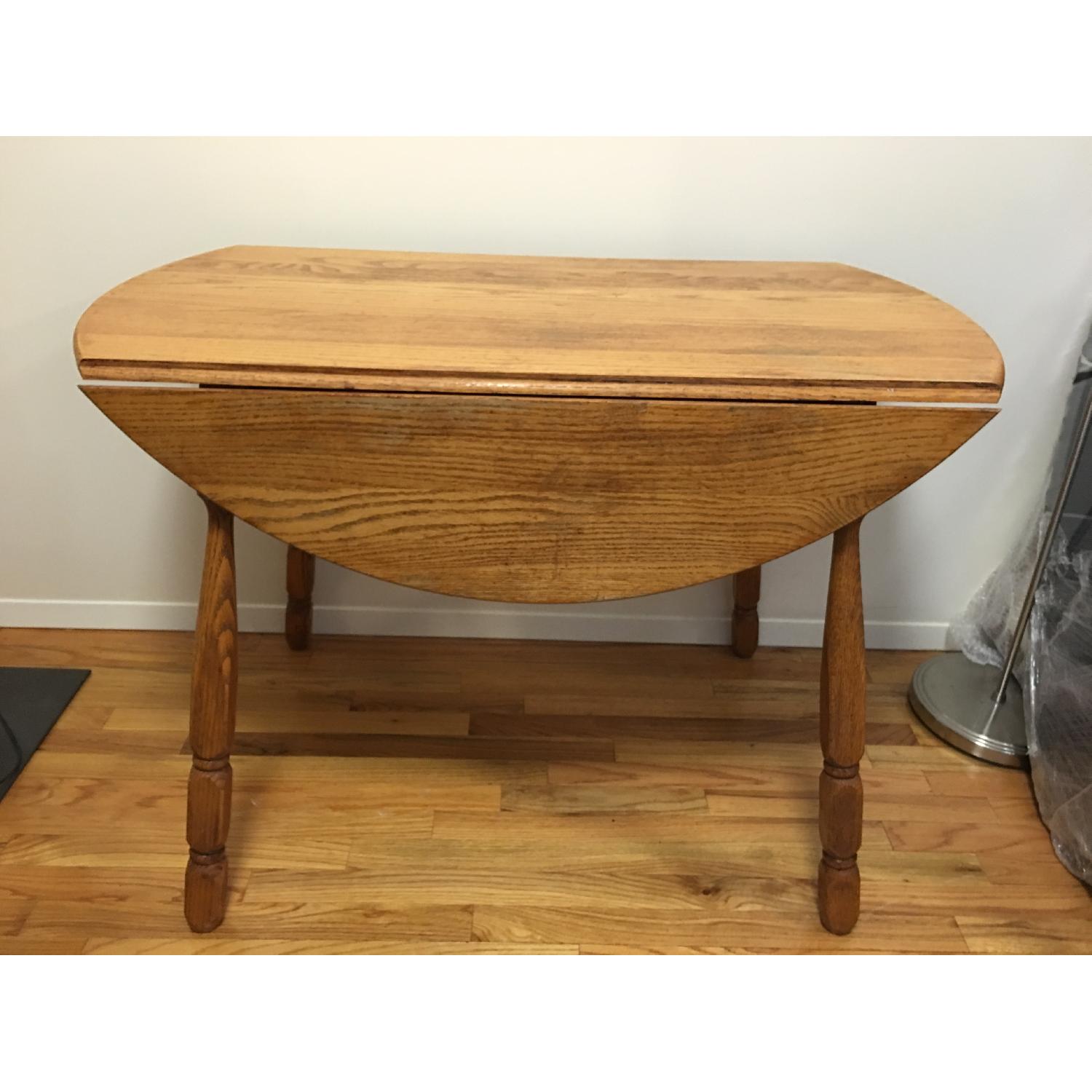 Solid Oak Drop Round Leaf Table w/ 4 Chairs - AptDeco