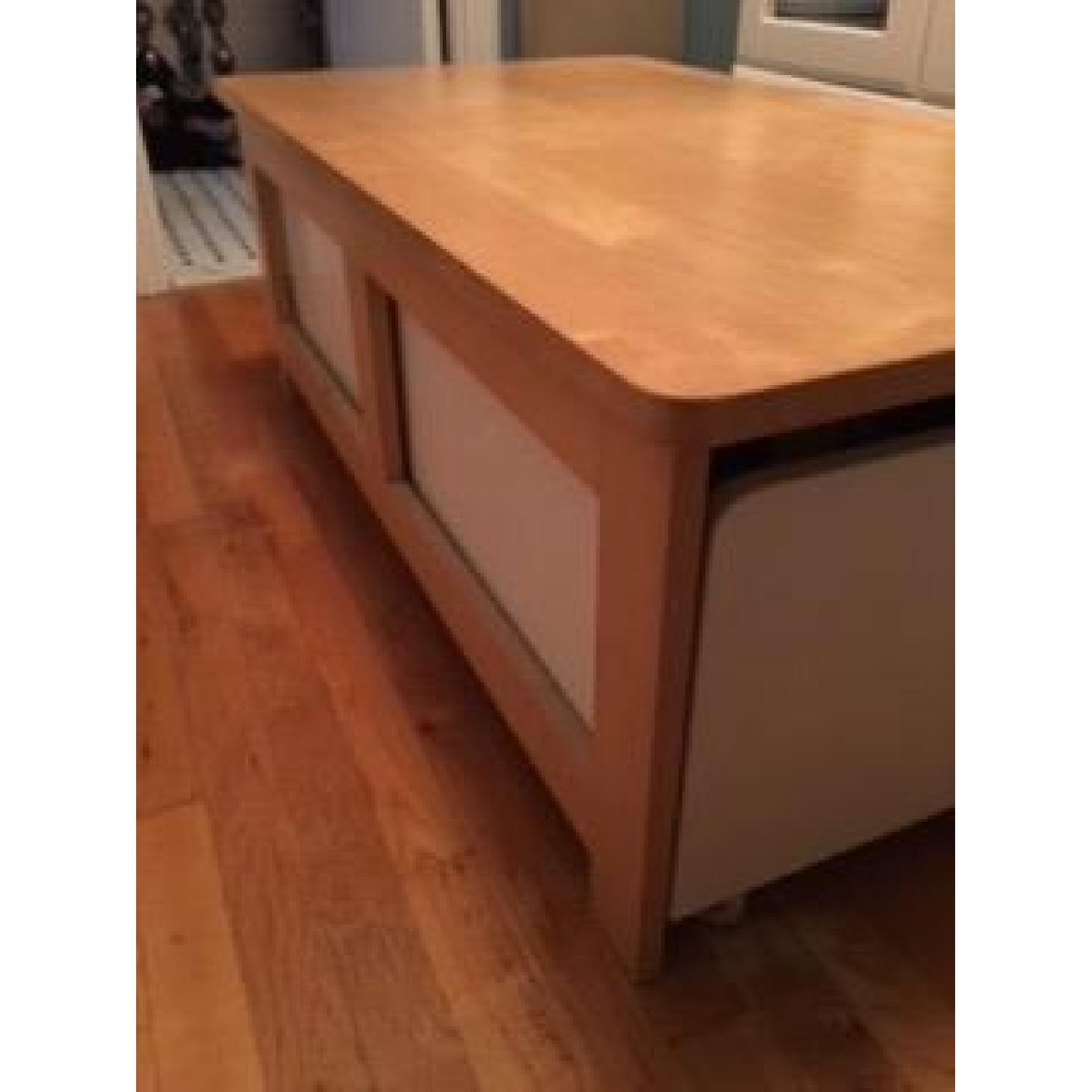 Ikea Coffee Table w/ Rolling Storage - AptDeco