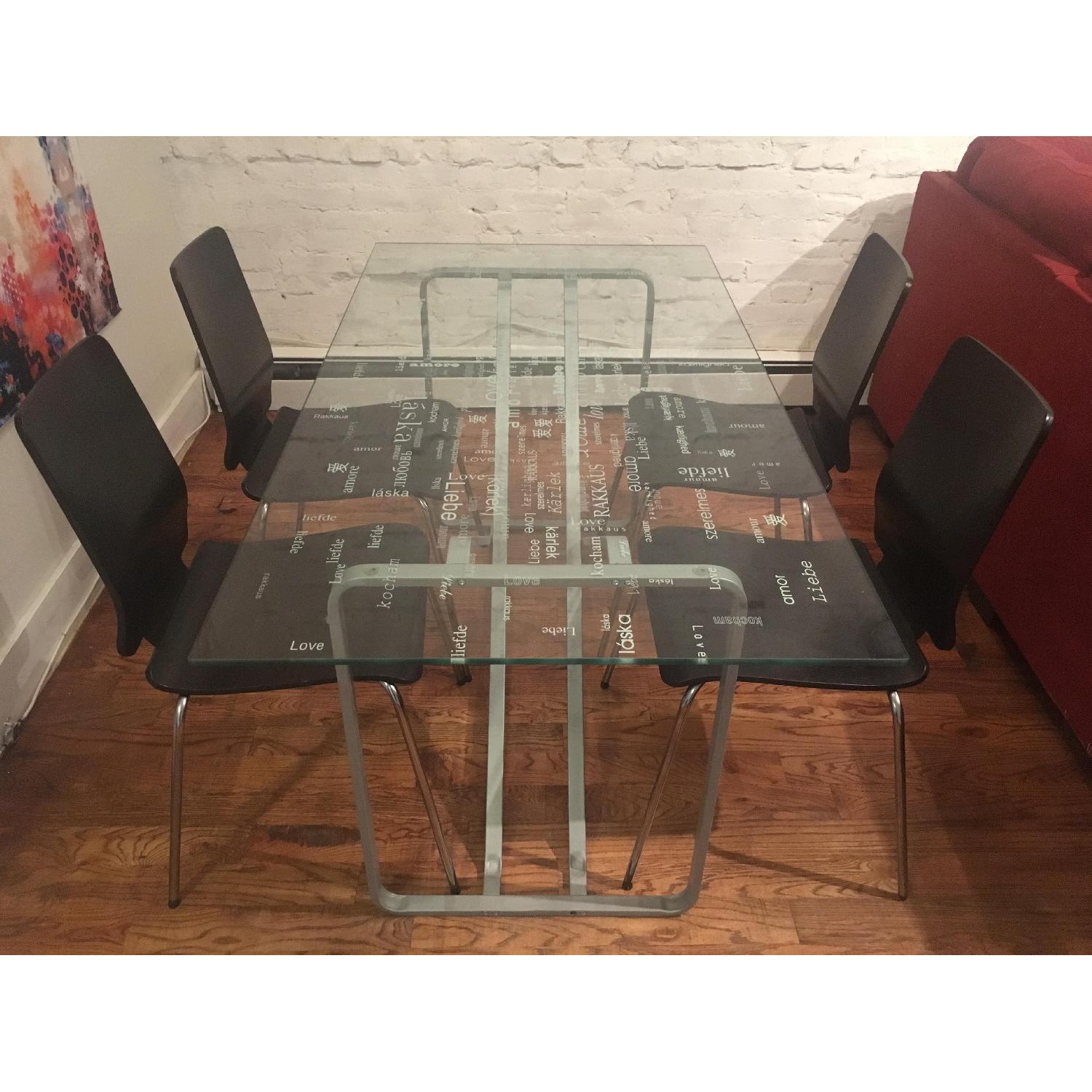 Ikea Glass Dining Table w/ 4 Black Martin Chairs - AptDeco