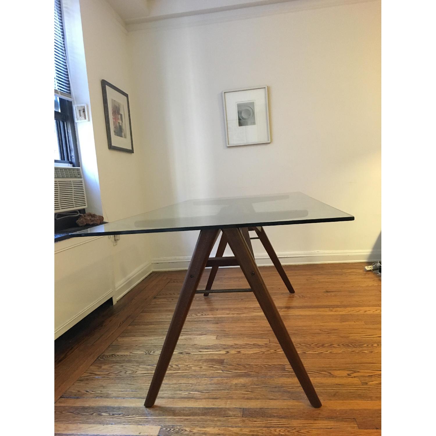 West Elm Modern Glass & Walnut-Stained Dining Table - AptDeco