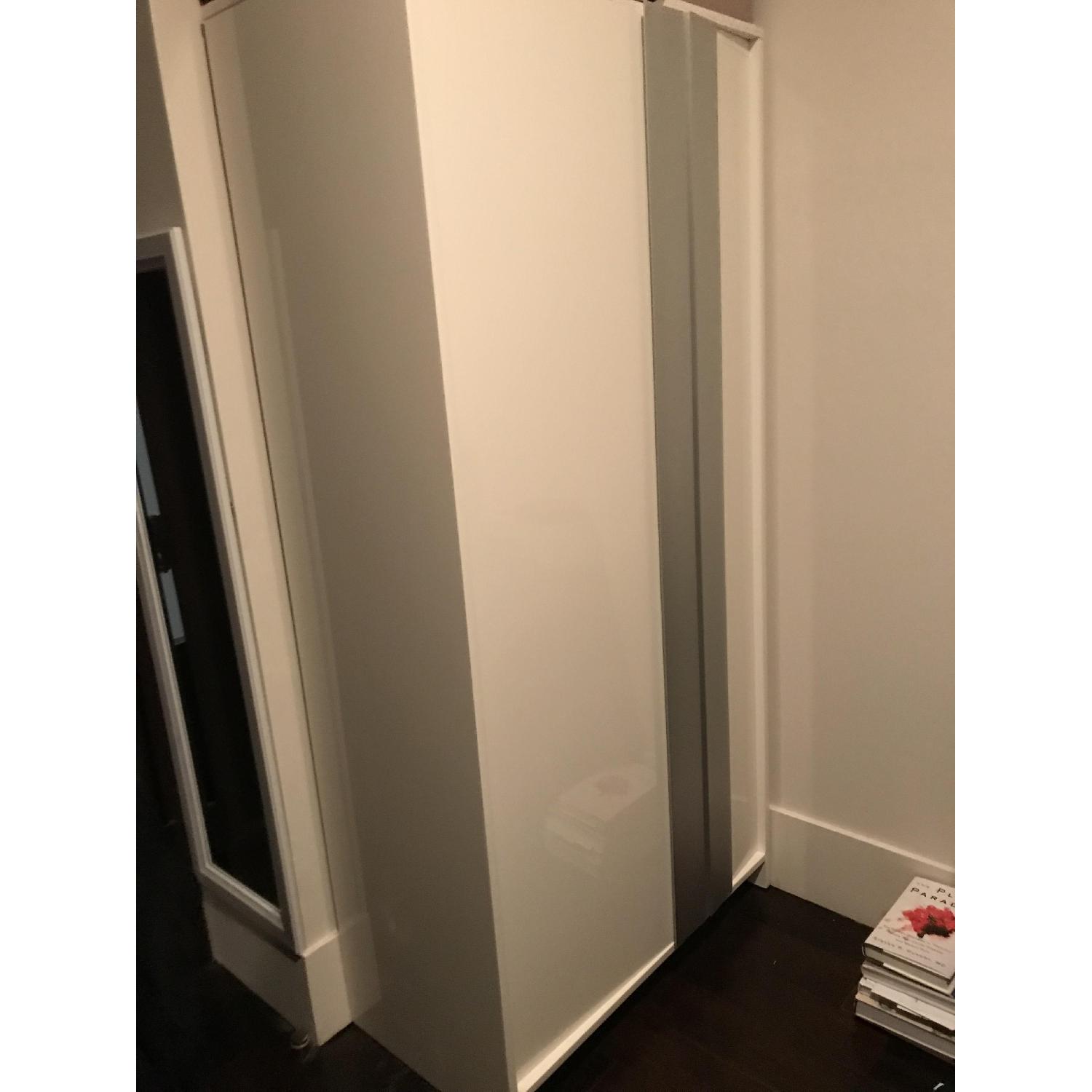 CB2 White Wall Wardrobe/Storage Cabinet - AptDeco