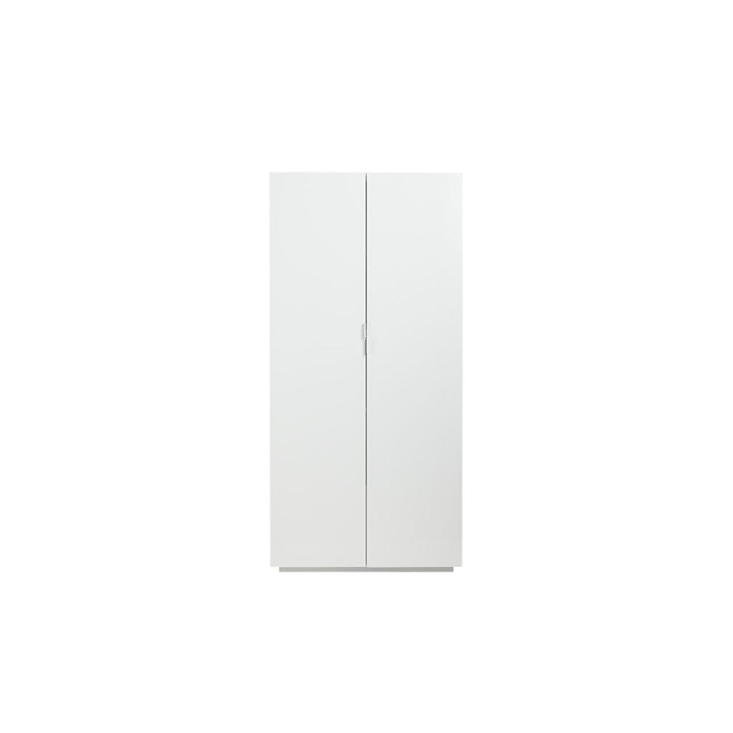 CB2 White Wall Wardrobe/Storage Cabinet - AptDeco