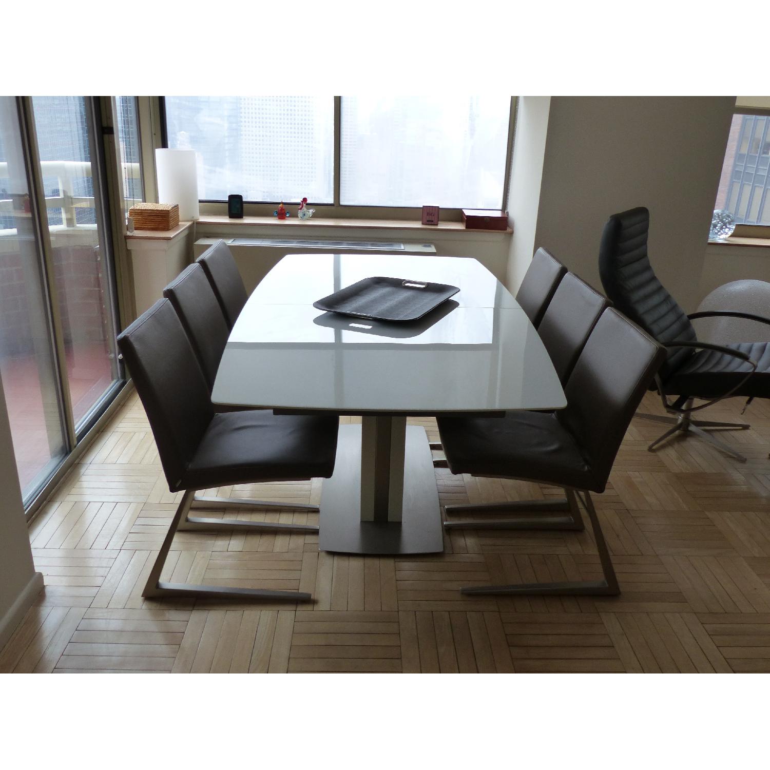 BoConcept Occa White Glass Brushed Steel Table w/ 8 Chairs - AptDeco