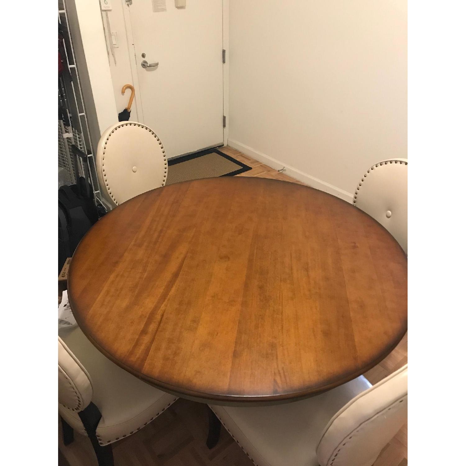 Pier 1 Sage Round Dining Table - AptDeco