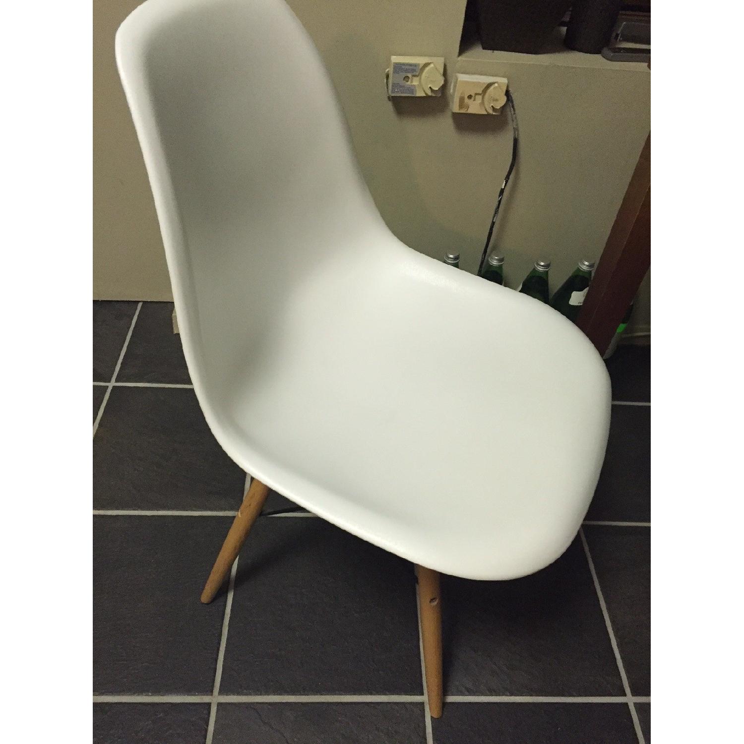Eames Replica Molded Plastic Chairs in White - AptDeco