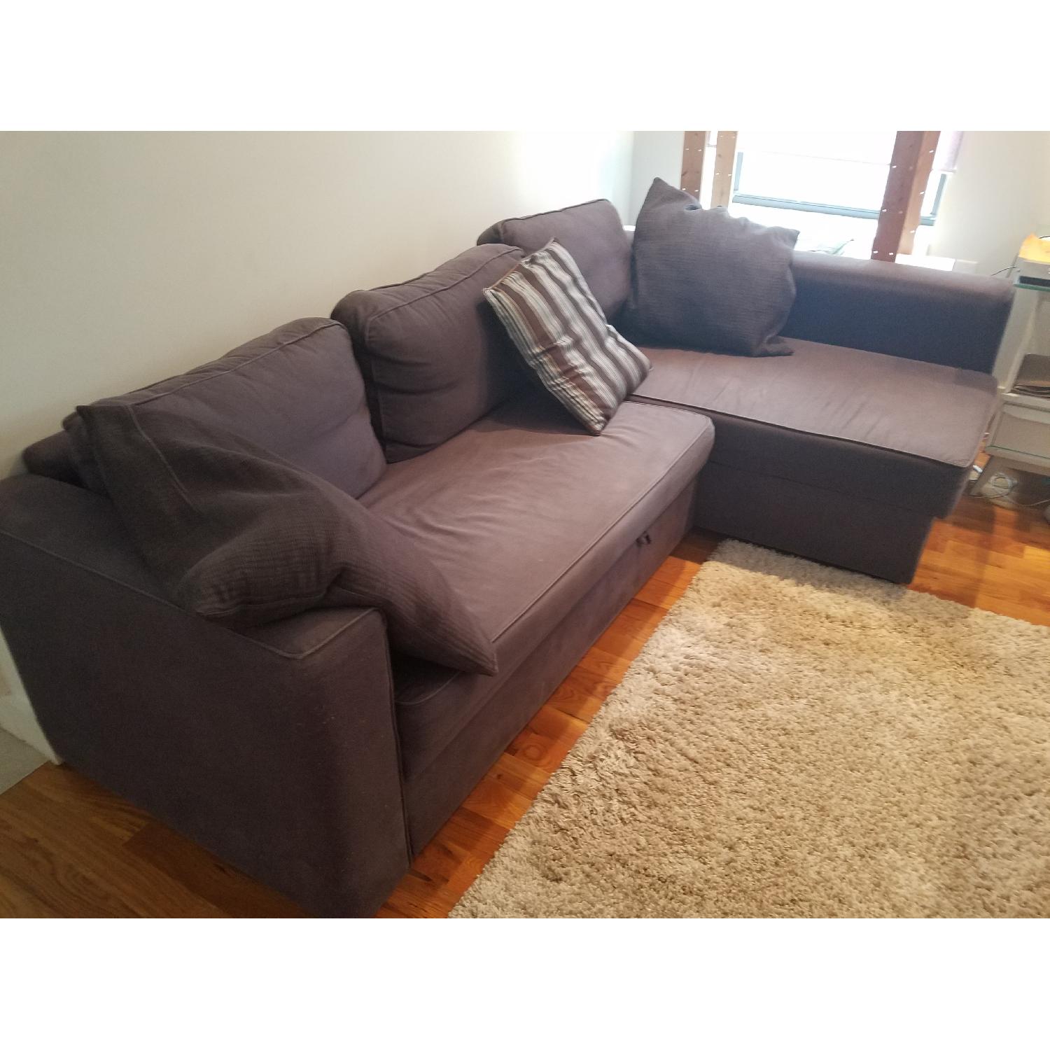 Grey Sectional Sofa w/ Pull-Out Bed - AptDeco