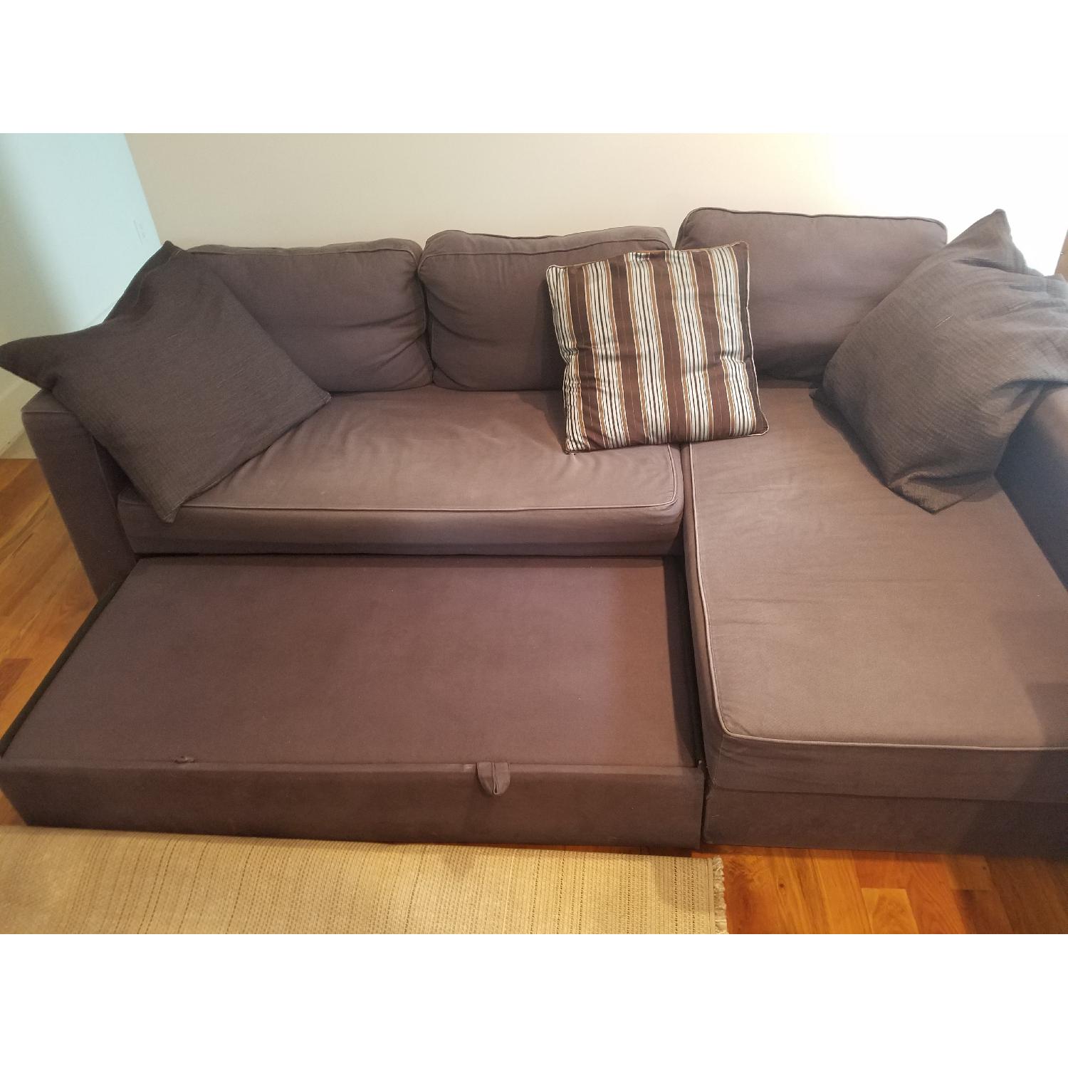 Grey Sectional Sofa w/ Pull-Out Bed - AptDeco