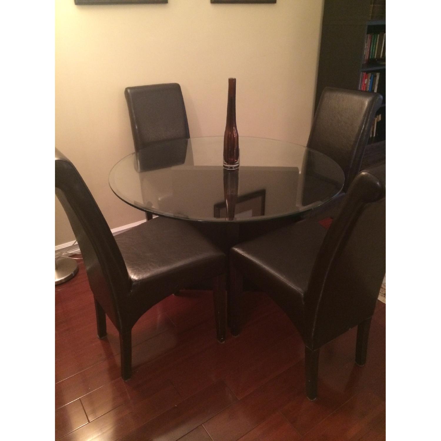 Glass Dining Table w/ 4 Leather Chairs - AptDeco