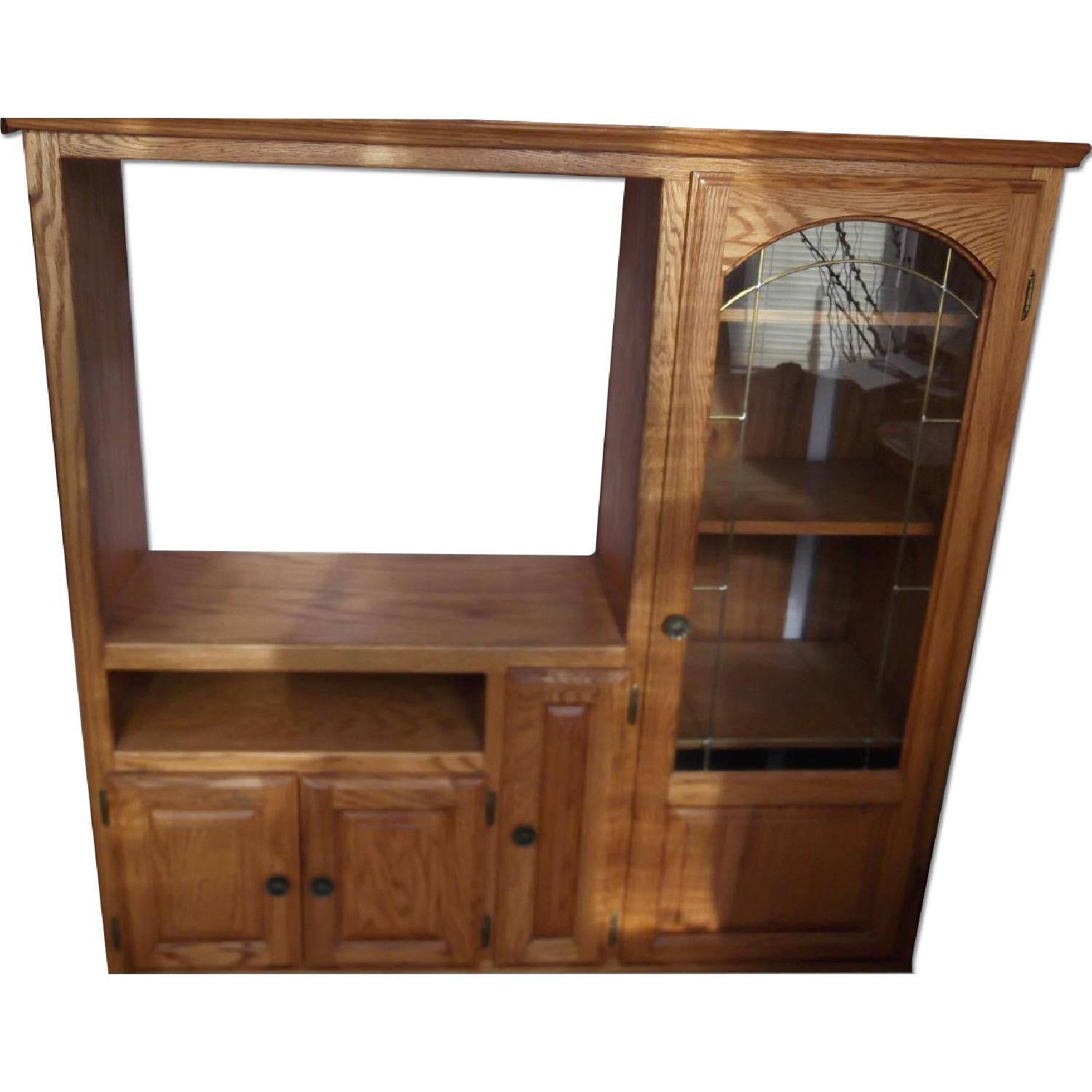 Parker Beveled Glass Entertainment Center on Wheels - AptDeco