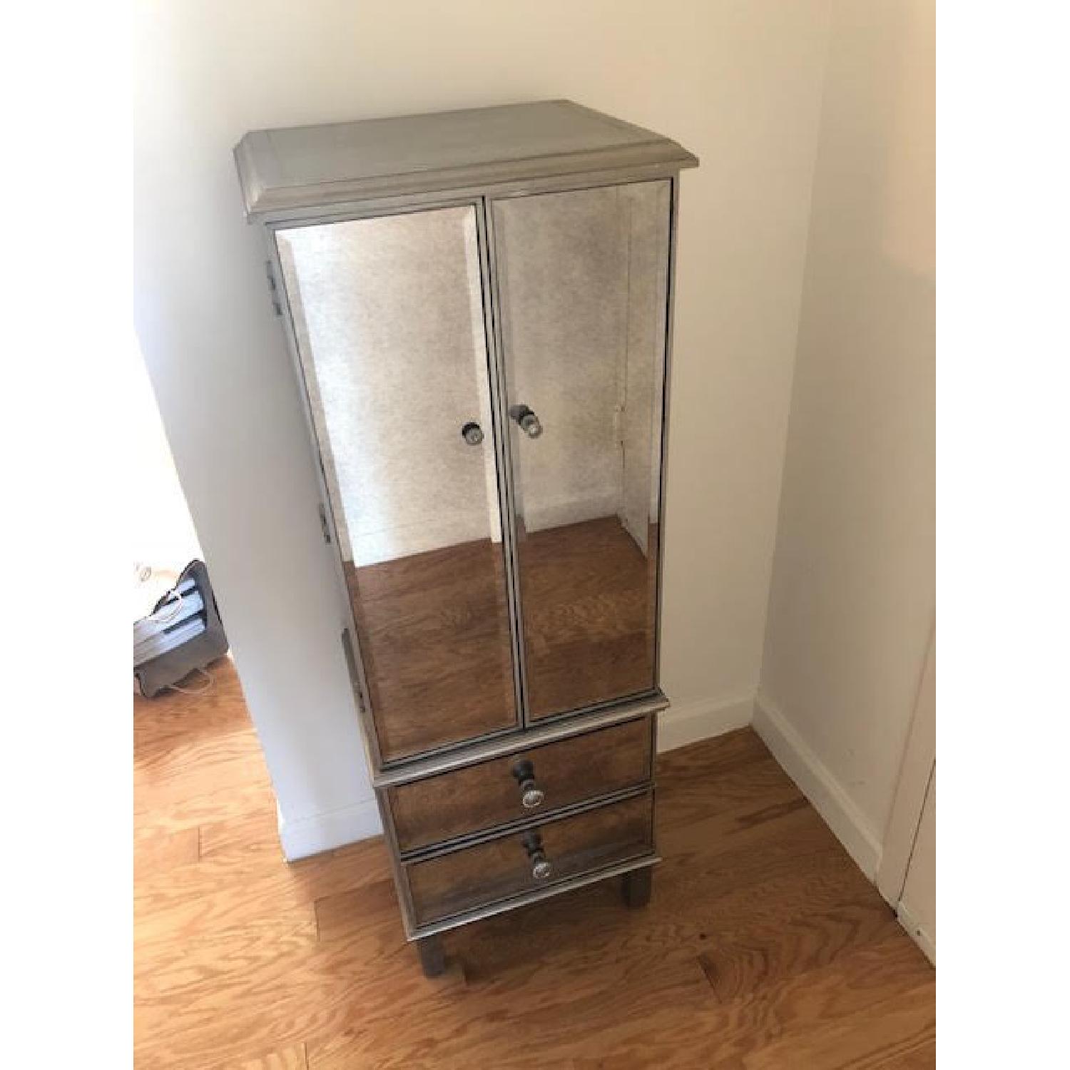 Pier 1 Mirrored Silver Jewelry Armoire - AptDeco