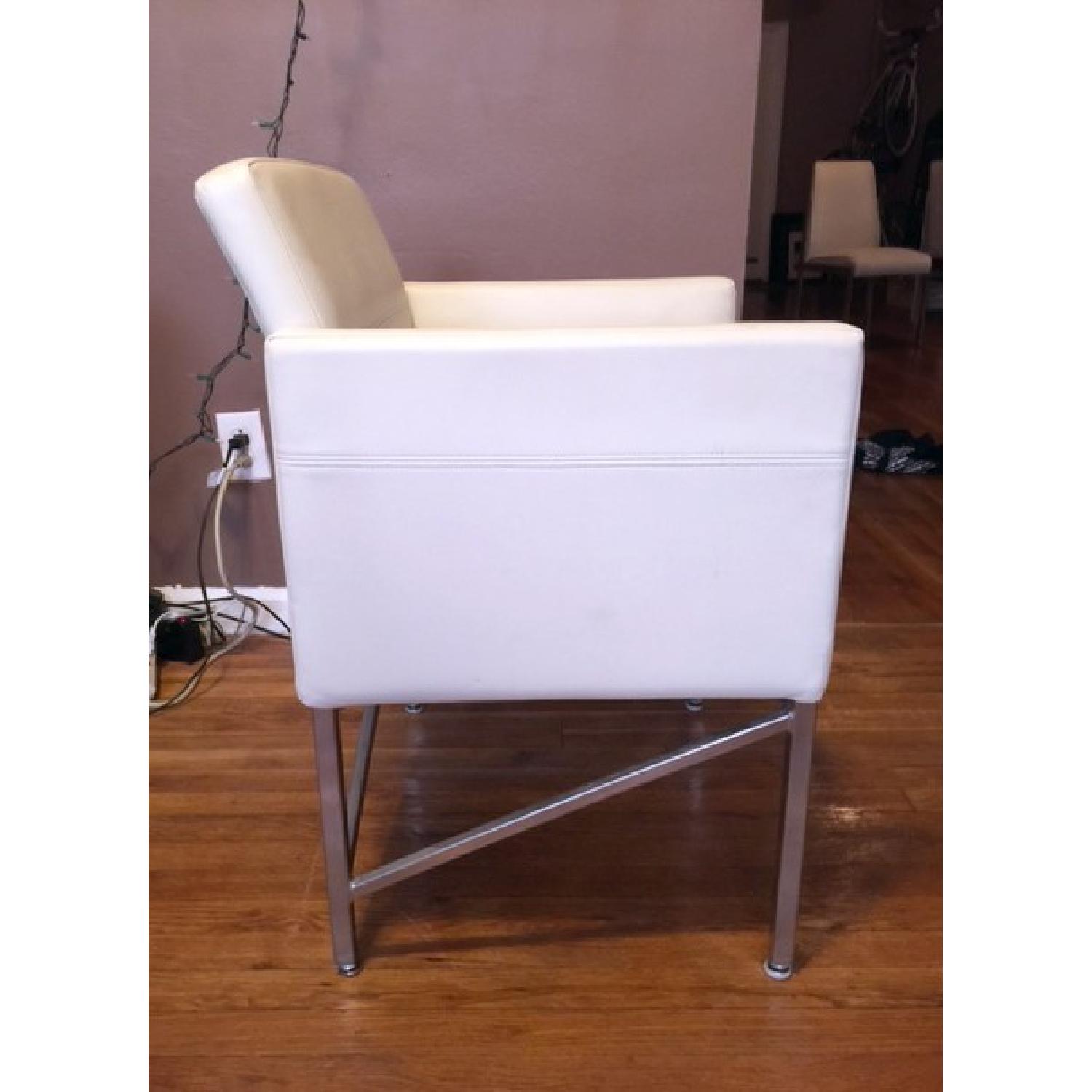 White Faux Leather Chairs w/ Metal Frame - AptDeco
