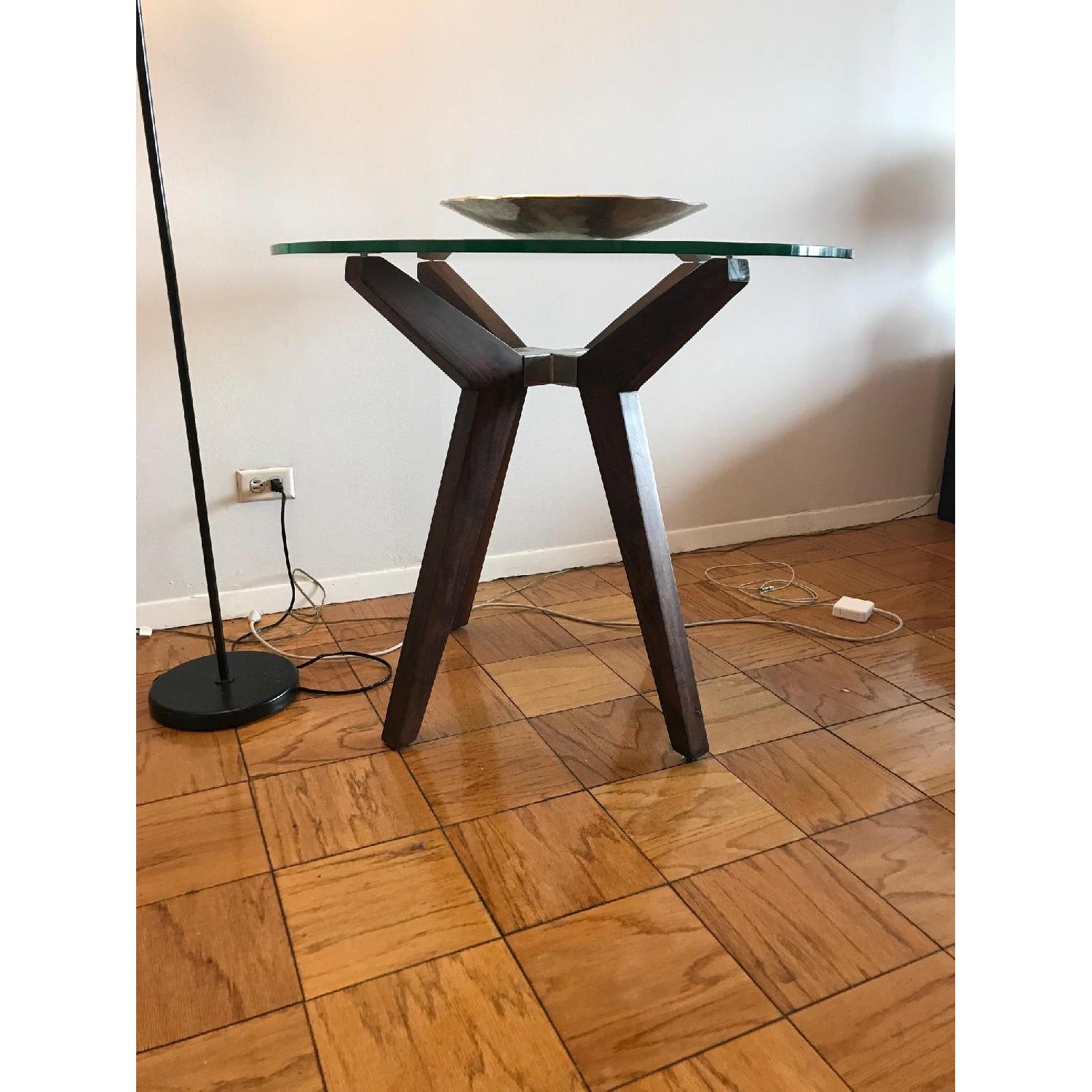 Crate & Barrel Strut Glass Top Round Table - AptDeco