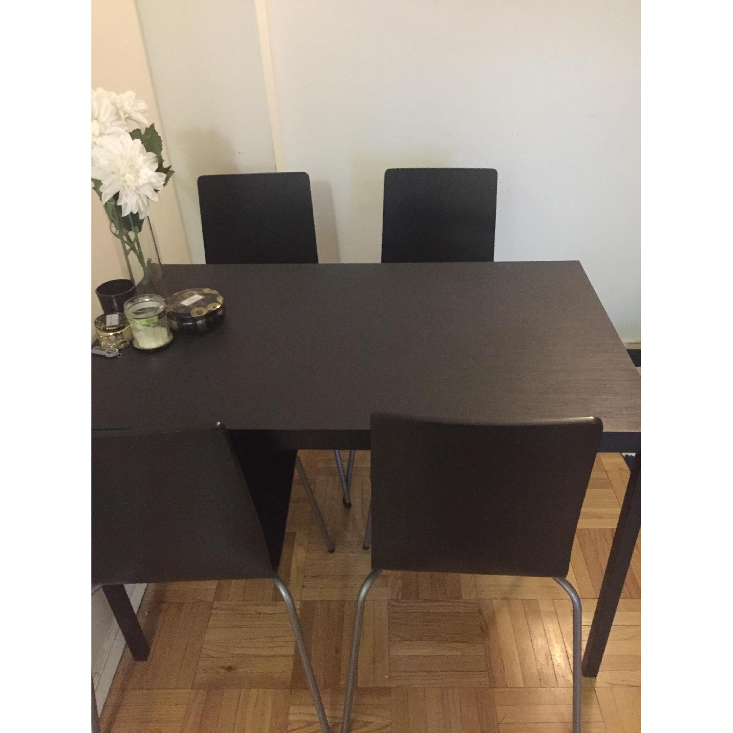 Ikea Black Dining Table w/ 4 Chairs - AptDeco