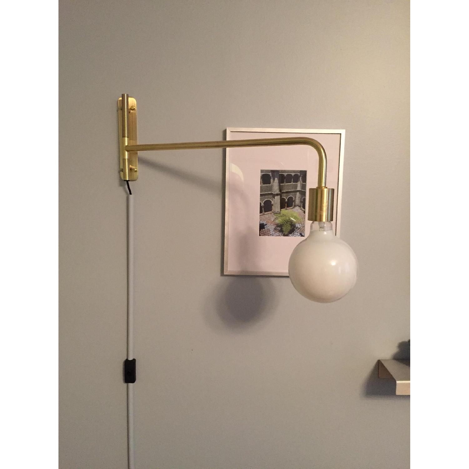 CB2 Swing Arm Brass Wall Sconces - AptDeco