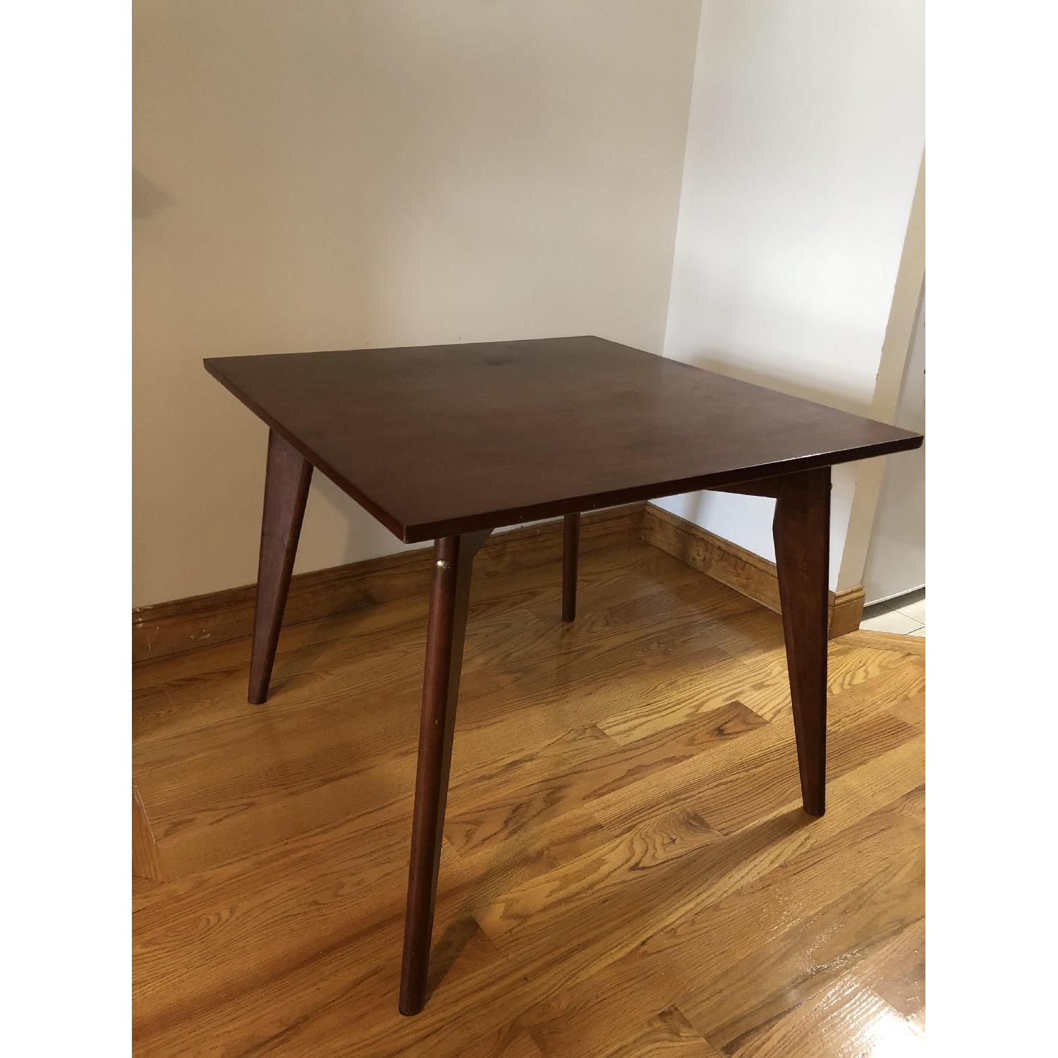 Urban Outfitters Tinka Mid-Century Modern Dining Table - AptDeco