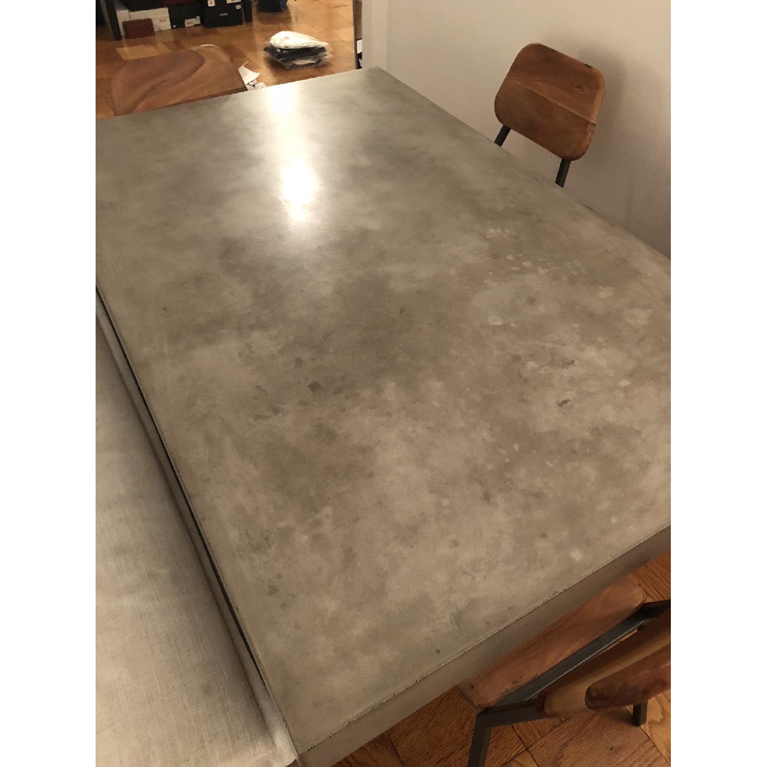 CB2 Fuze Stone Dining Table w/ 1 Bench & 4 Chairs - AptDeco